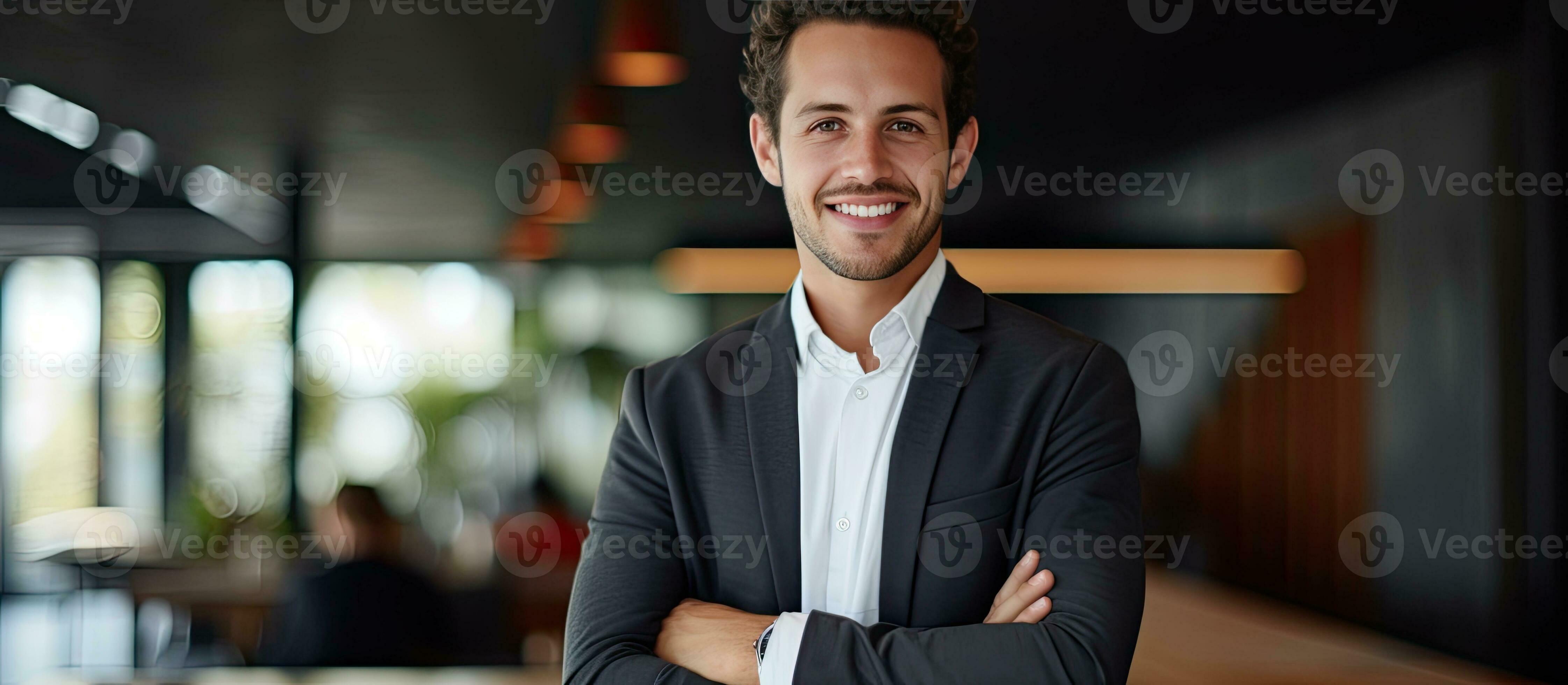 Millennial man happy businessman at office desk posing and smiling at camera Copy space 27296065 ...
