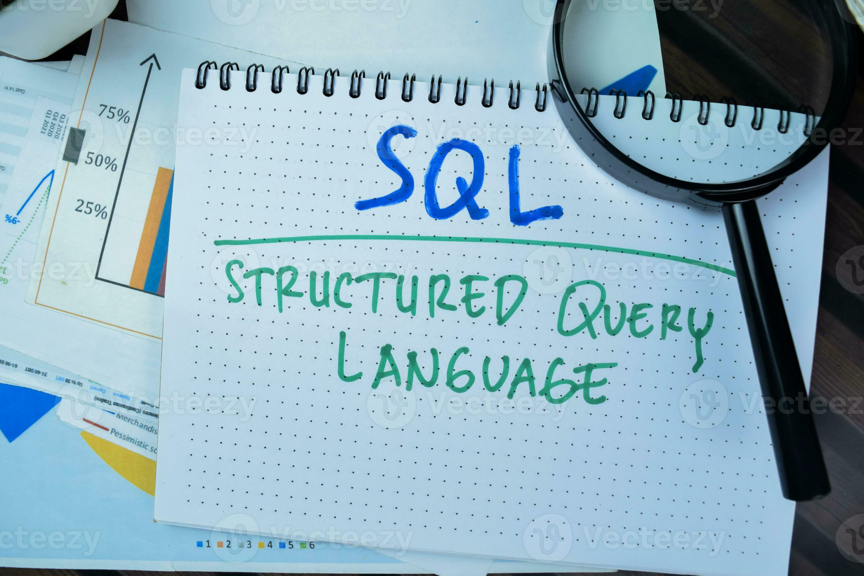 Concept of SQL - Structured Query Language write on book isolated on Wooden Table. 27296465 ...