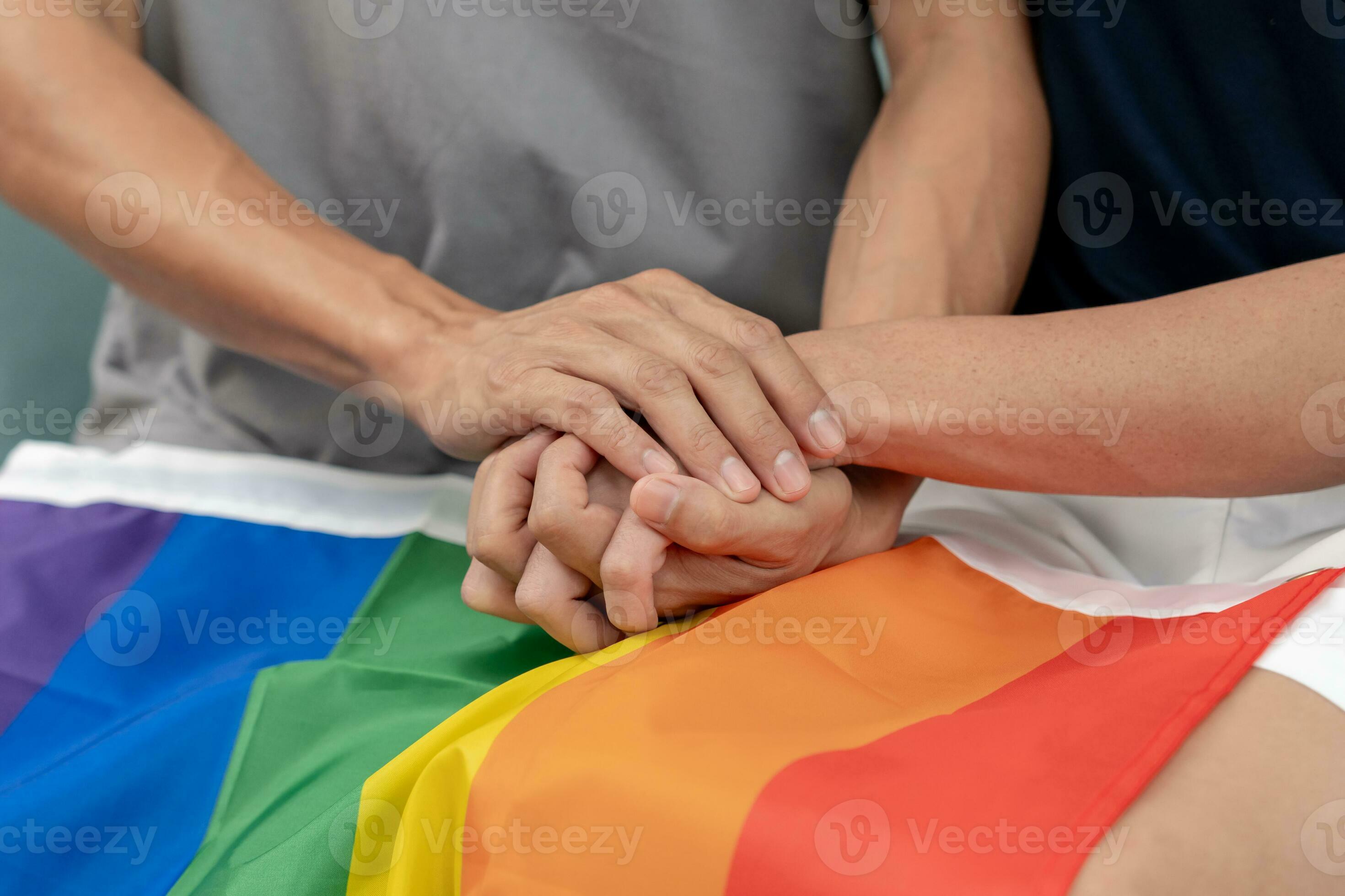LGBT group. Male bisexualities couple holding hands encourage and show ...