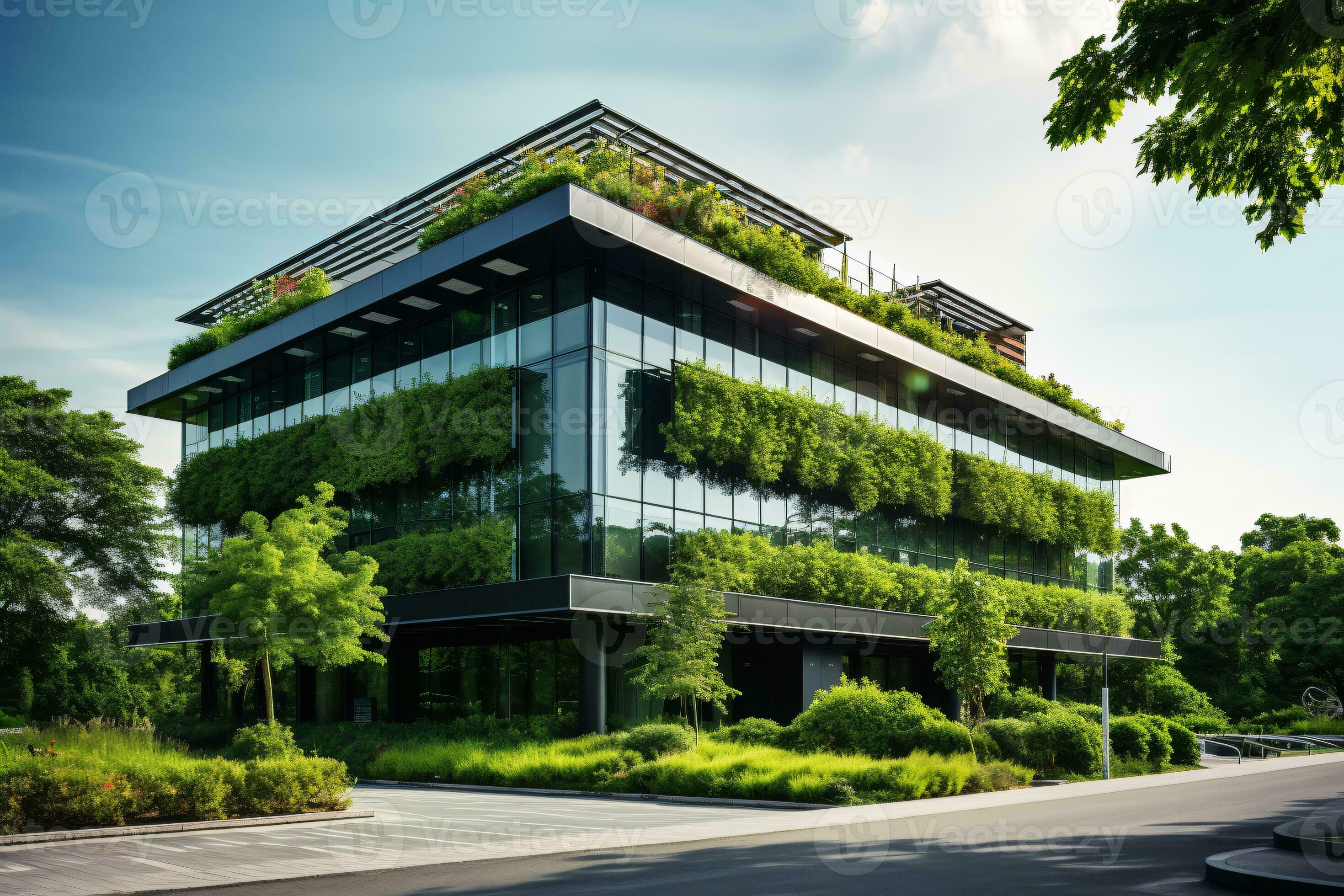 Eco-friendly building in the modern city. Sustainable glass office building with tree for ...