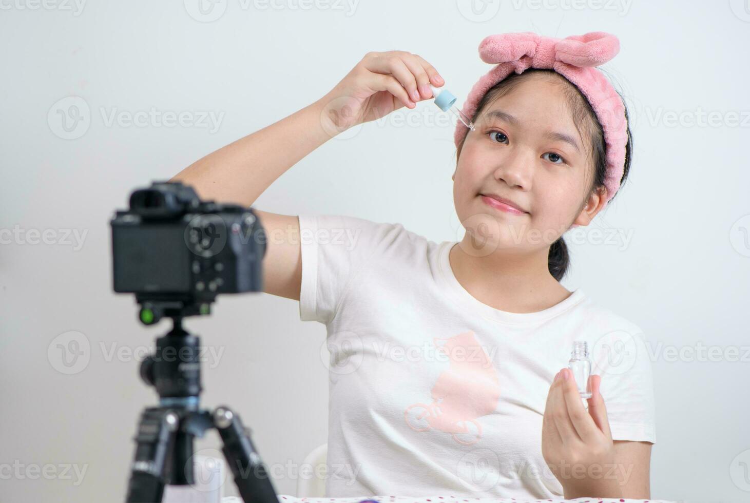 Beauty girl blogger concept, Asian woman hold professional cure serum bottle oil treatment ...