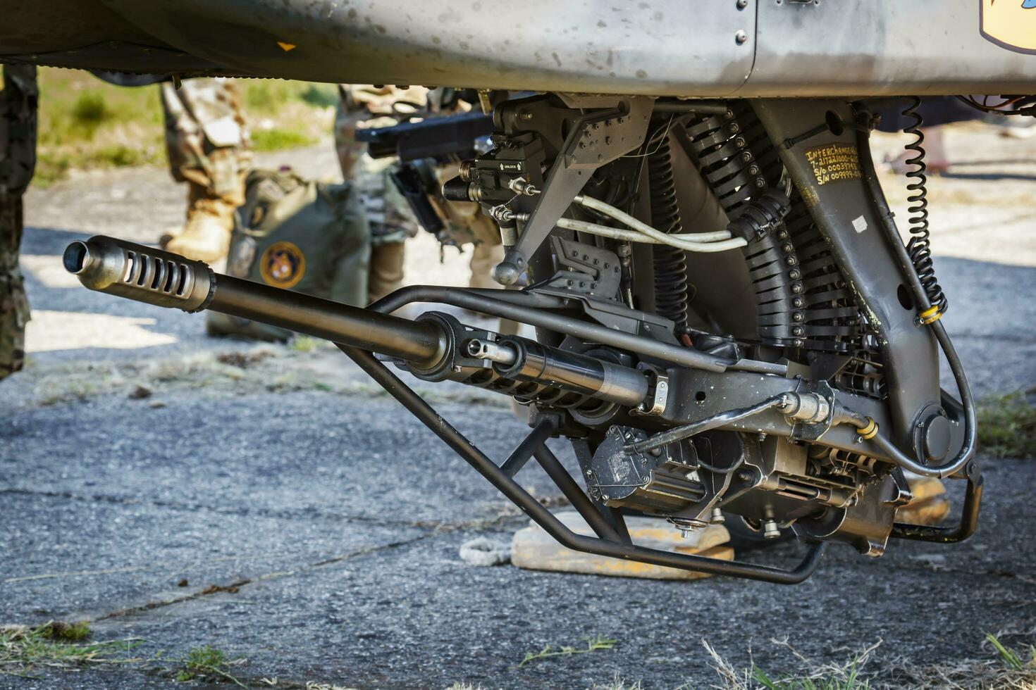 US Army Boeing AH-64 Apache military helicopter 30mm M230 Chain Gun system. Aviation and ...