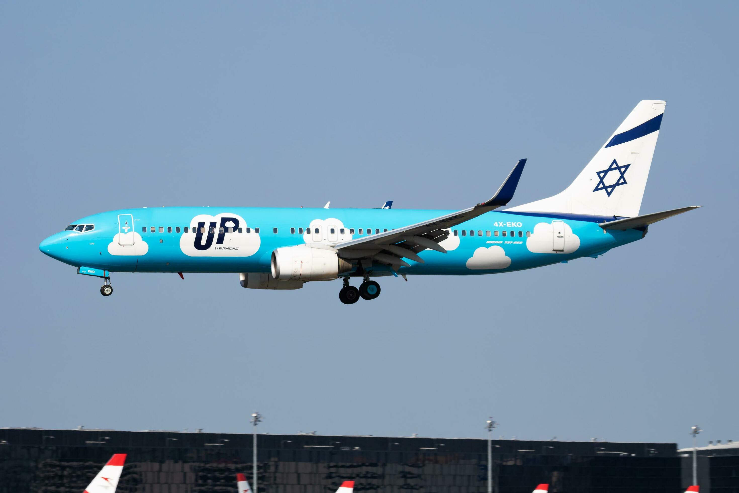 EL AL Israel Airlines UP Boeing 737-800 4X-EKO passenger plane arrival and landing at Vienna ...