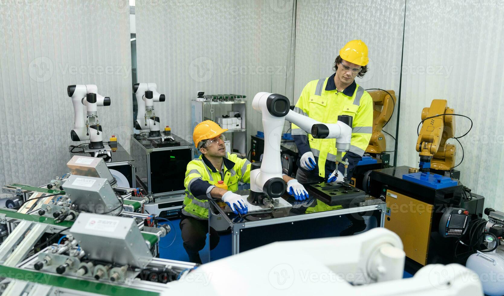 Two male automation machine engineer students studying training ...