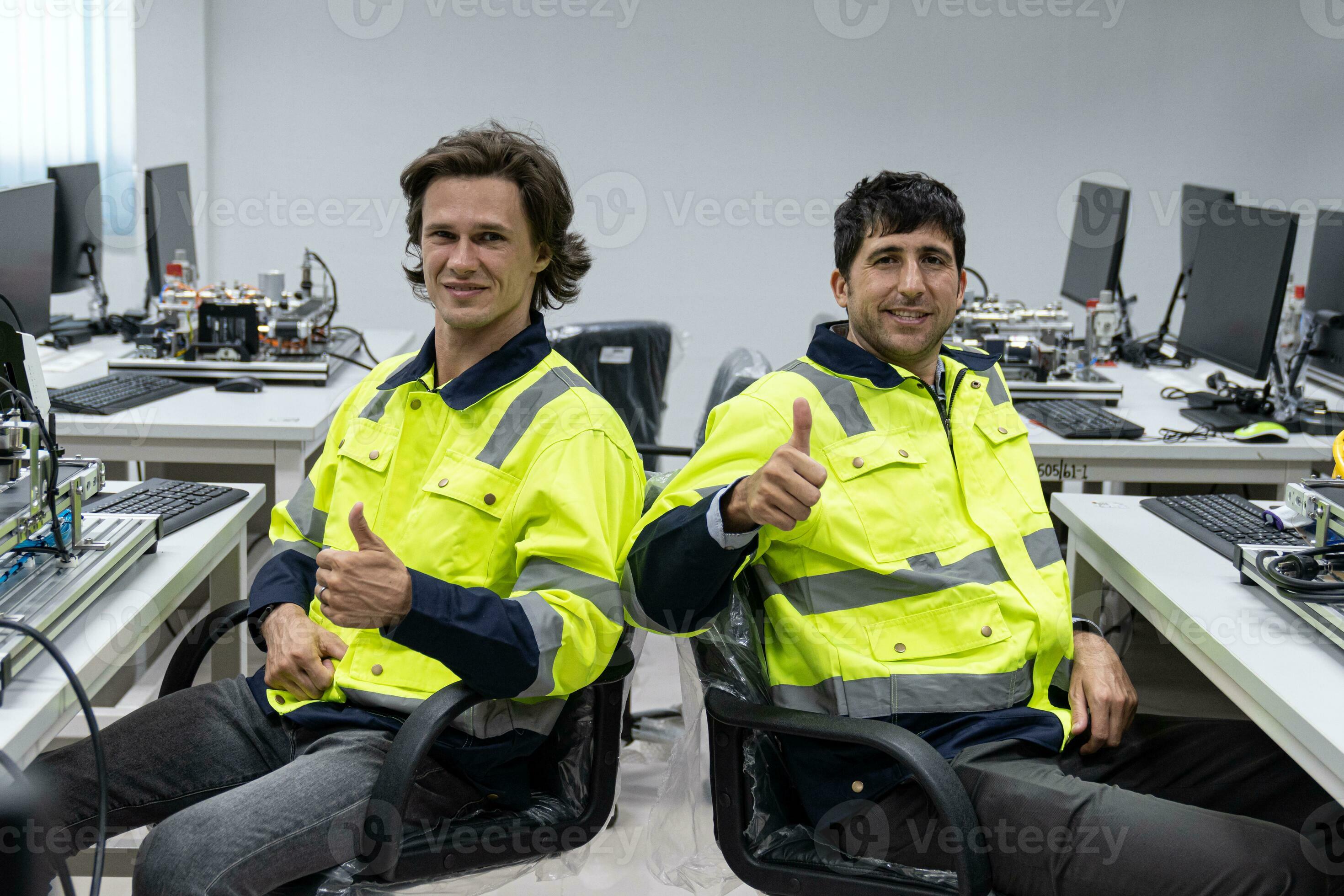 Two male automation machine engineer students studying training ...