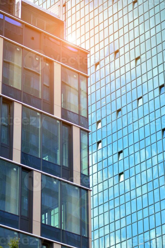Glass building with transparent facade of the building and blue sky ...