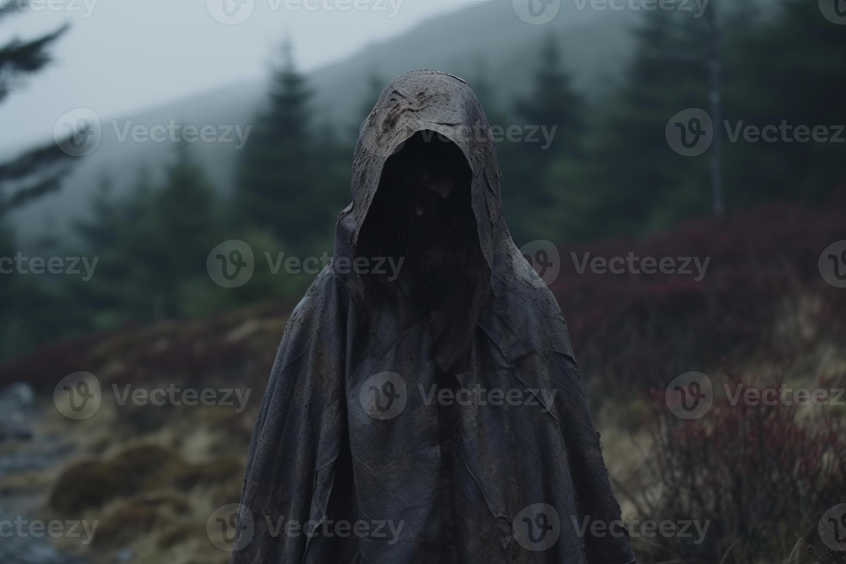 a man in a hooded cloak standing in the middle of a forest generative AI 28358630 Stock Photo at ...