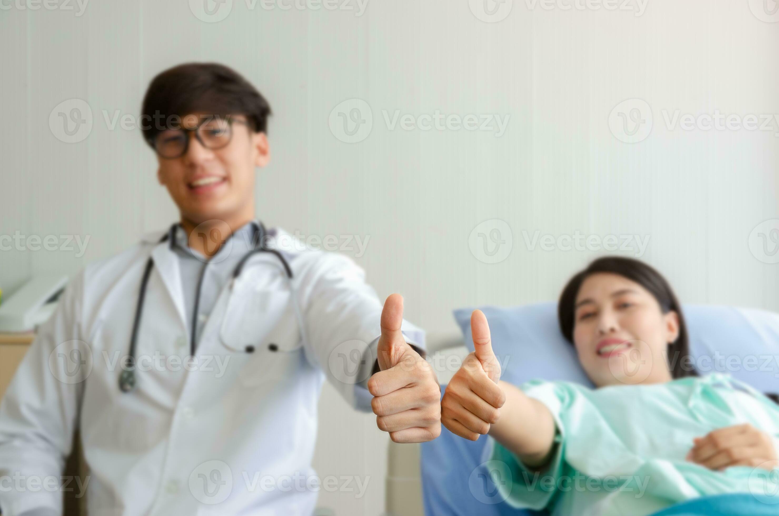 Thumbs up of doctor and patient in hospital ward 28536636 Stock Photo at Vecteezy