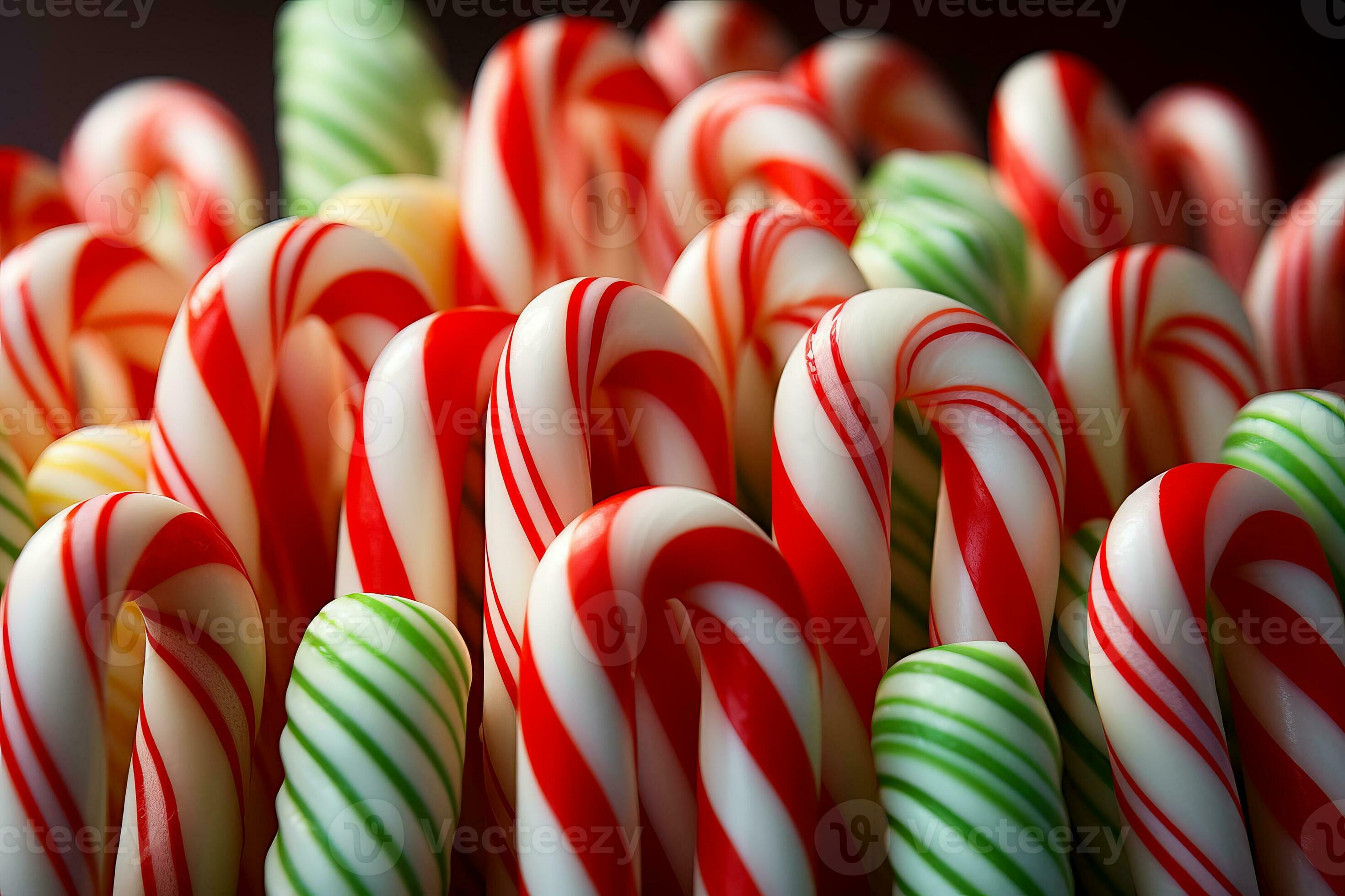 A close-up of colorful candy canes arranged in a low relief pattern ...