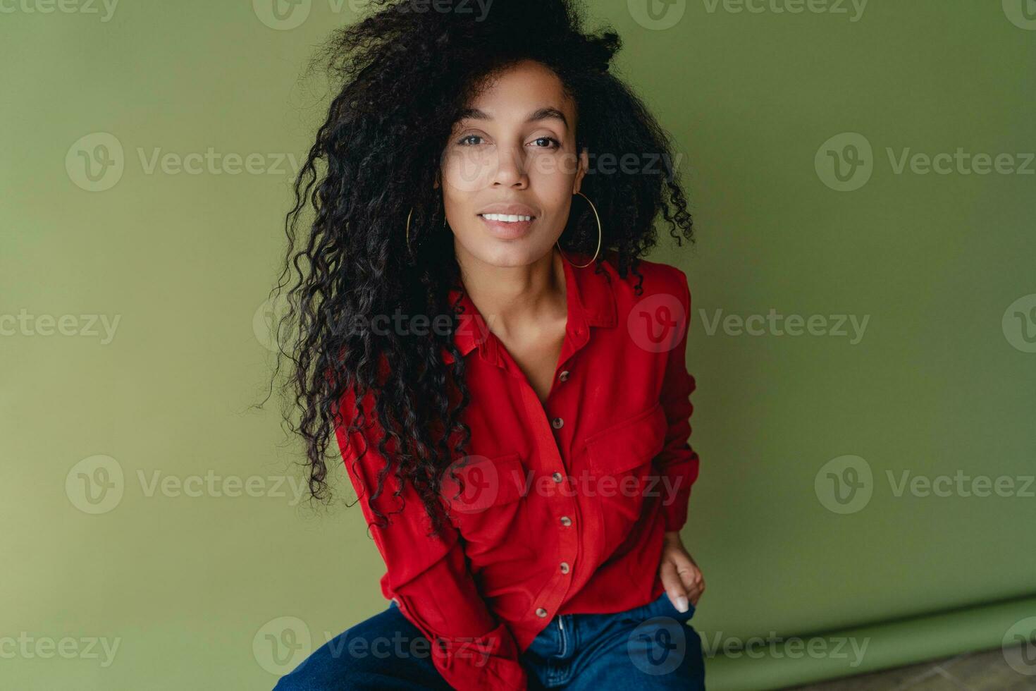 Attractive Black African American Woman In Stylish Outfit On Green