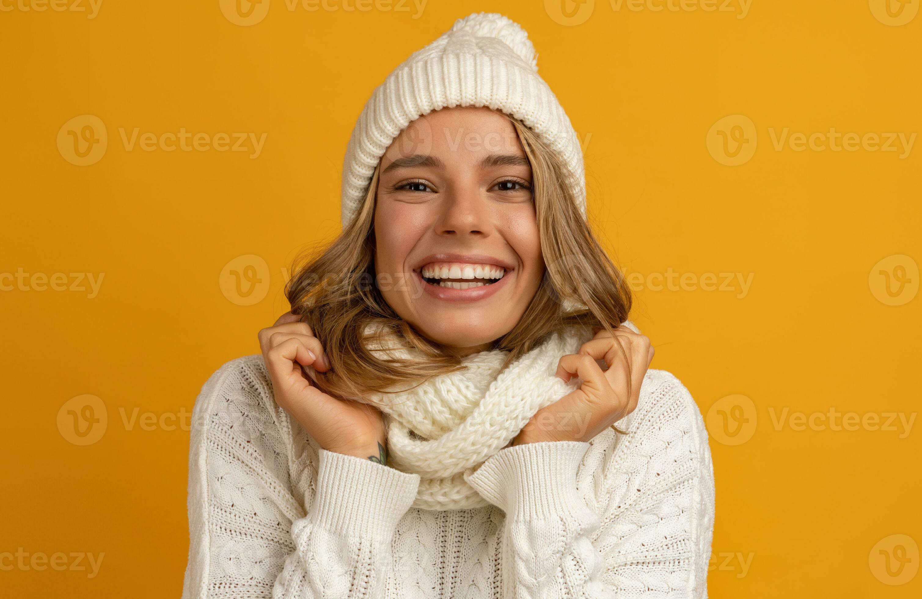 Young Smiling Happy Pretty Blond Woman Wearing White Knitted Sweater