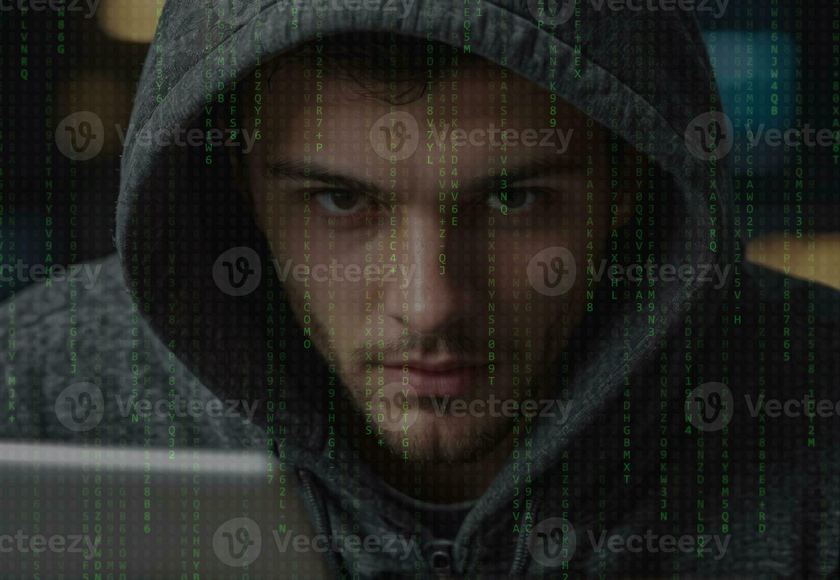 Hacker In A Hoodie Working On Laptop And Curtain Of Green Lines Of Code Cool Programmer