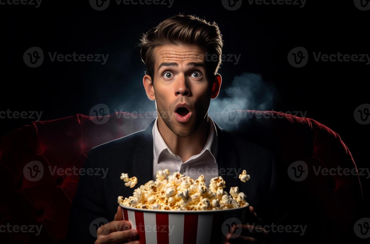 Man Eating Popcorn At The Cinema Cropped Image Of Young Man Eating