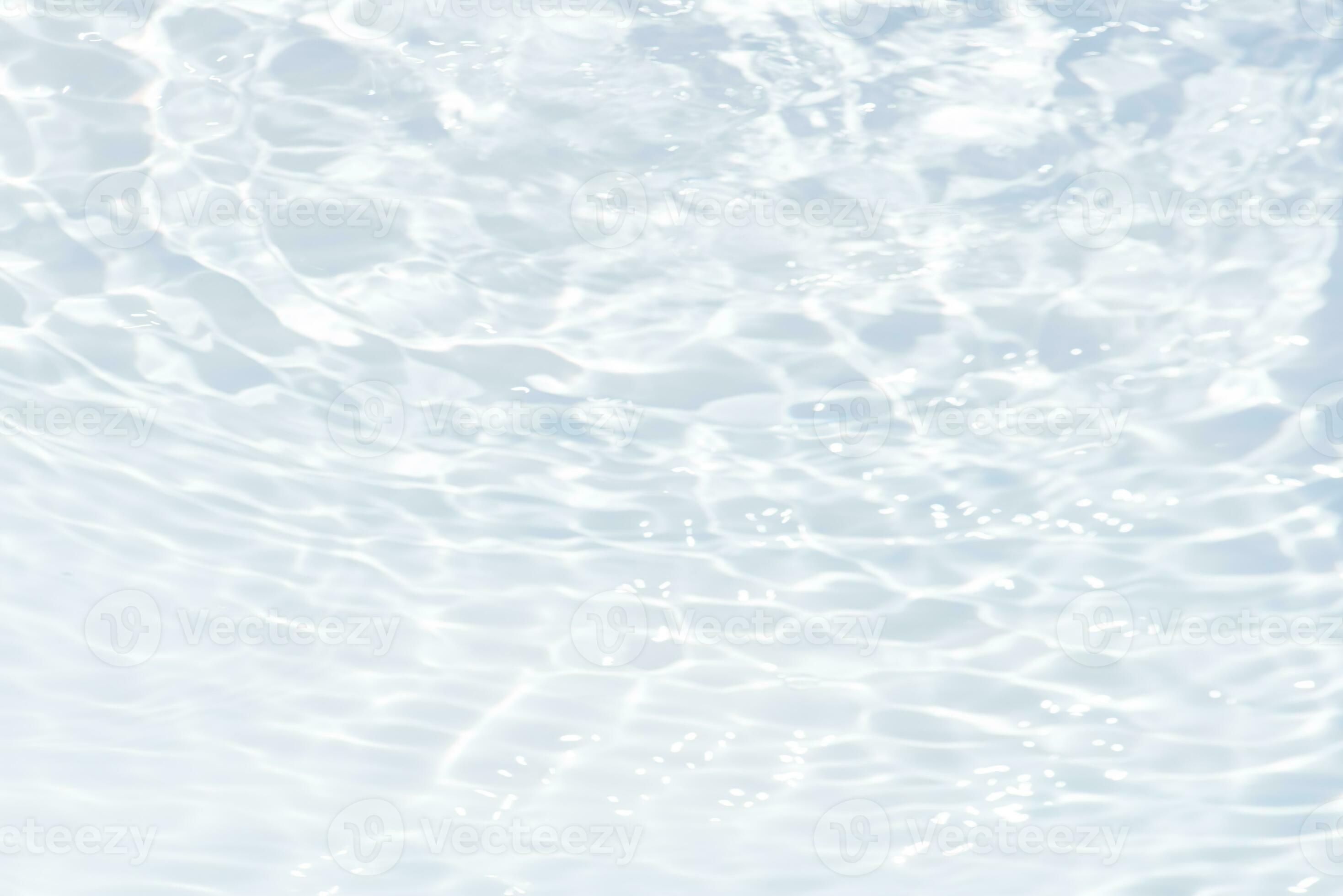 Blue water with ripples on the surface. Defocus blurred transparent blue colored clear calm ...