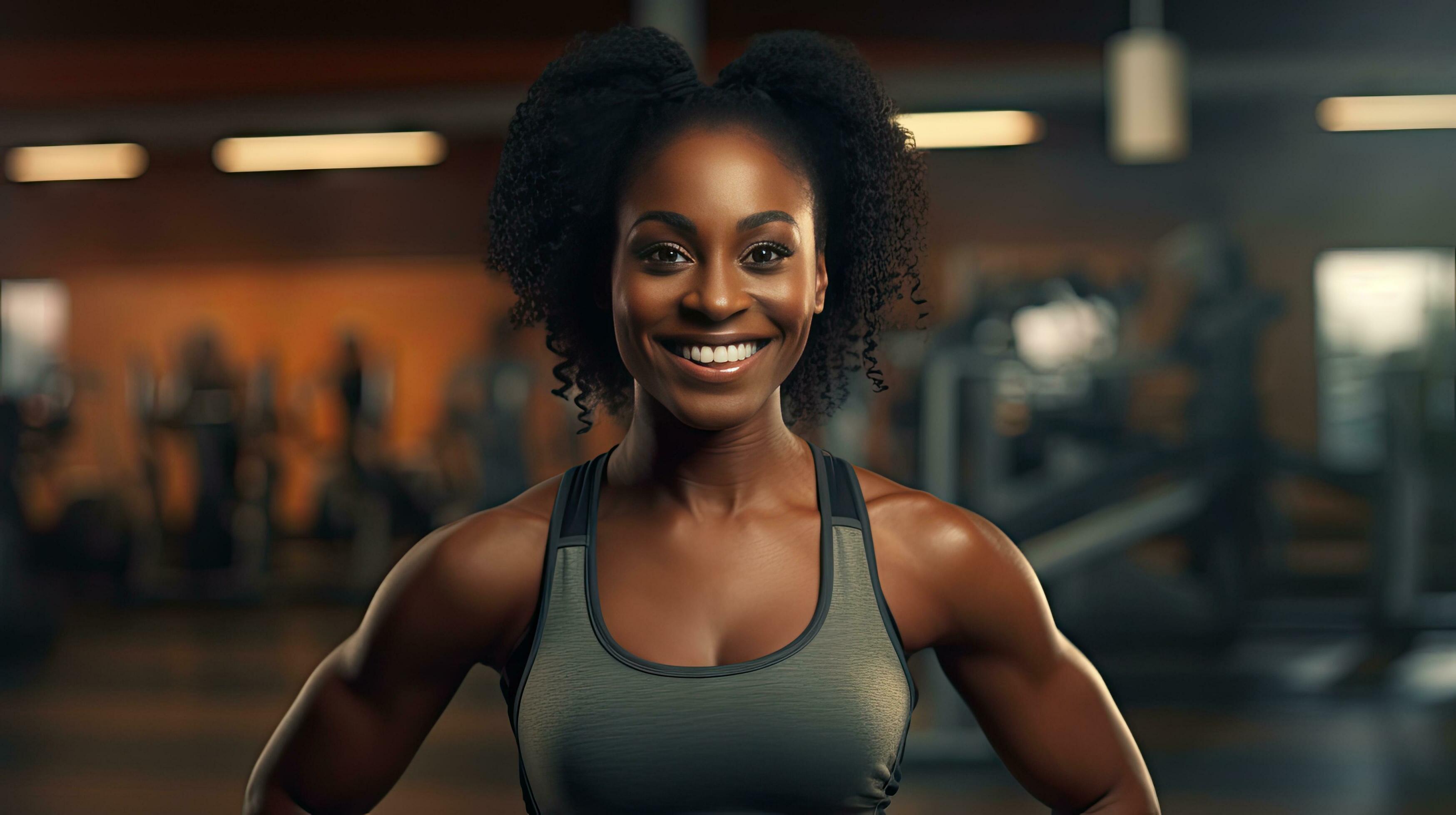 Black woman fitness, beautiful Afro-American woman with curly hair in the gym African fitness ...