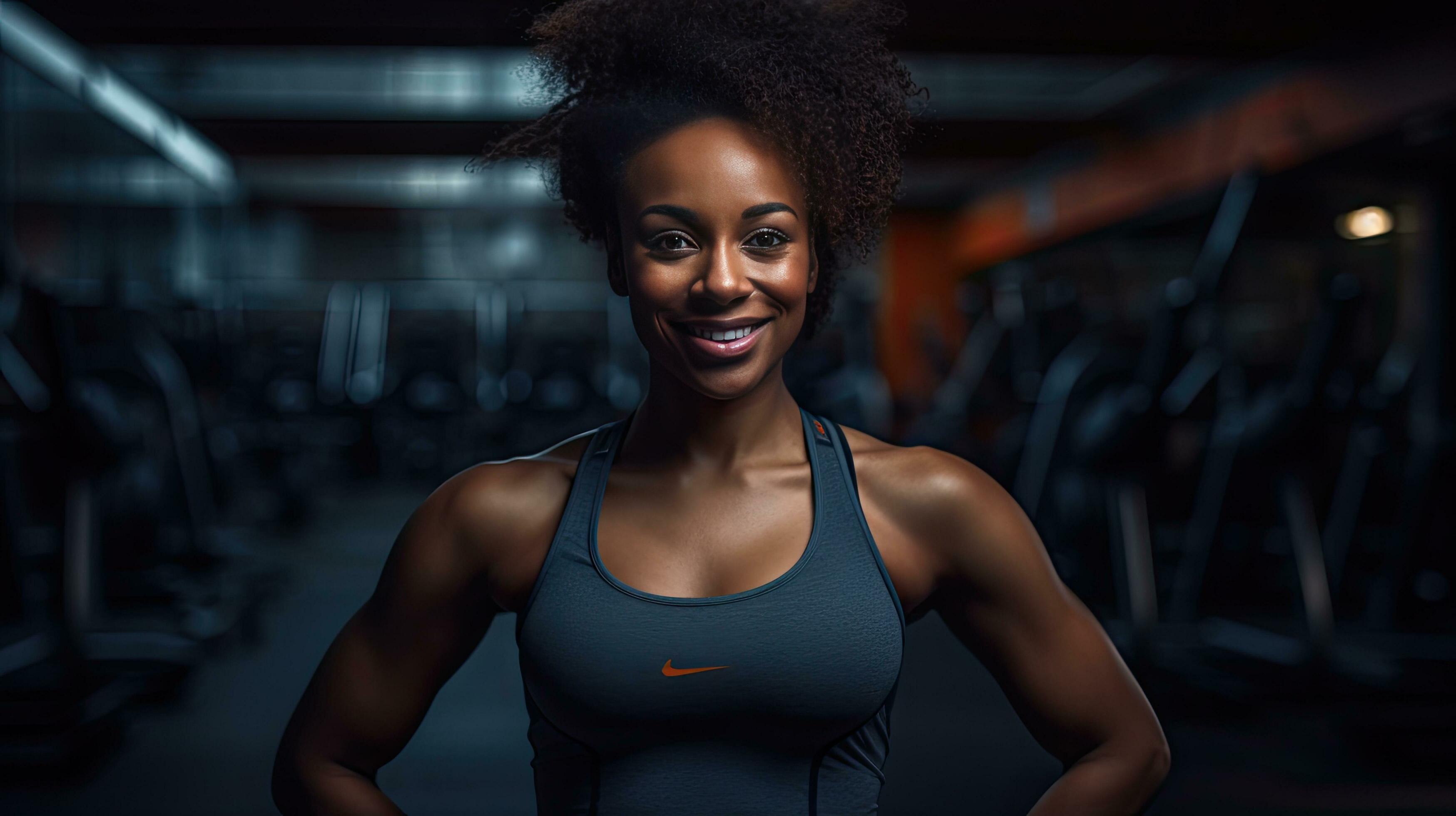 Black woman fitness, beautiful Afro-American woman with curly hair in the gym African fitness ...
