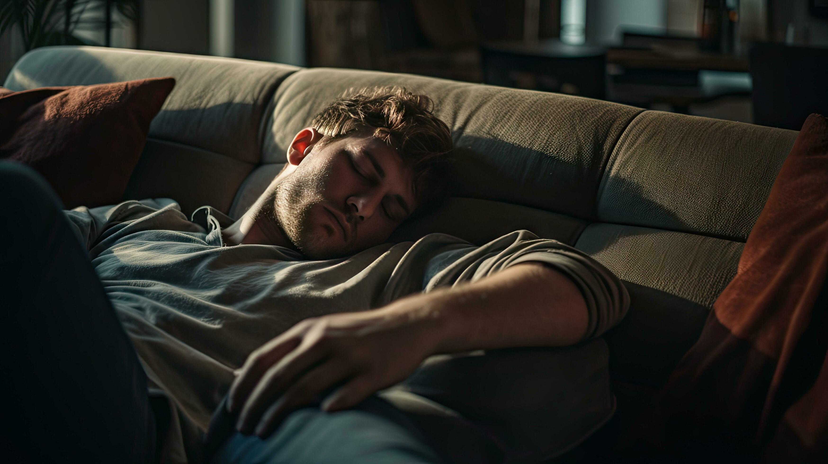 Young man sleeping on sofa at home 29633442 Stock Photo at Vecteezy