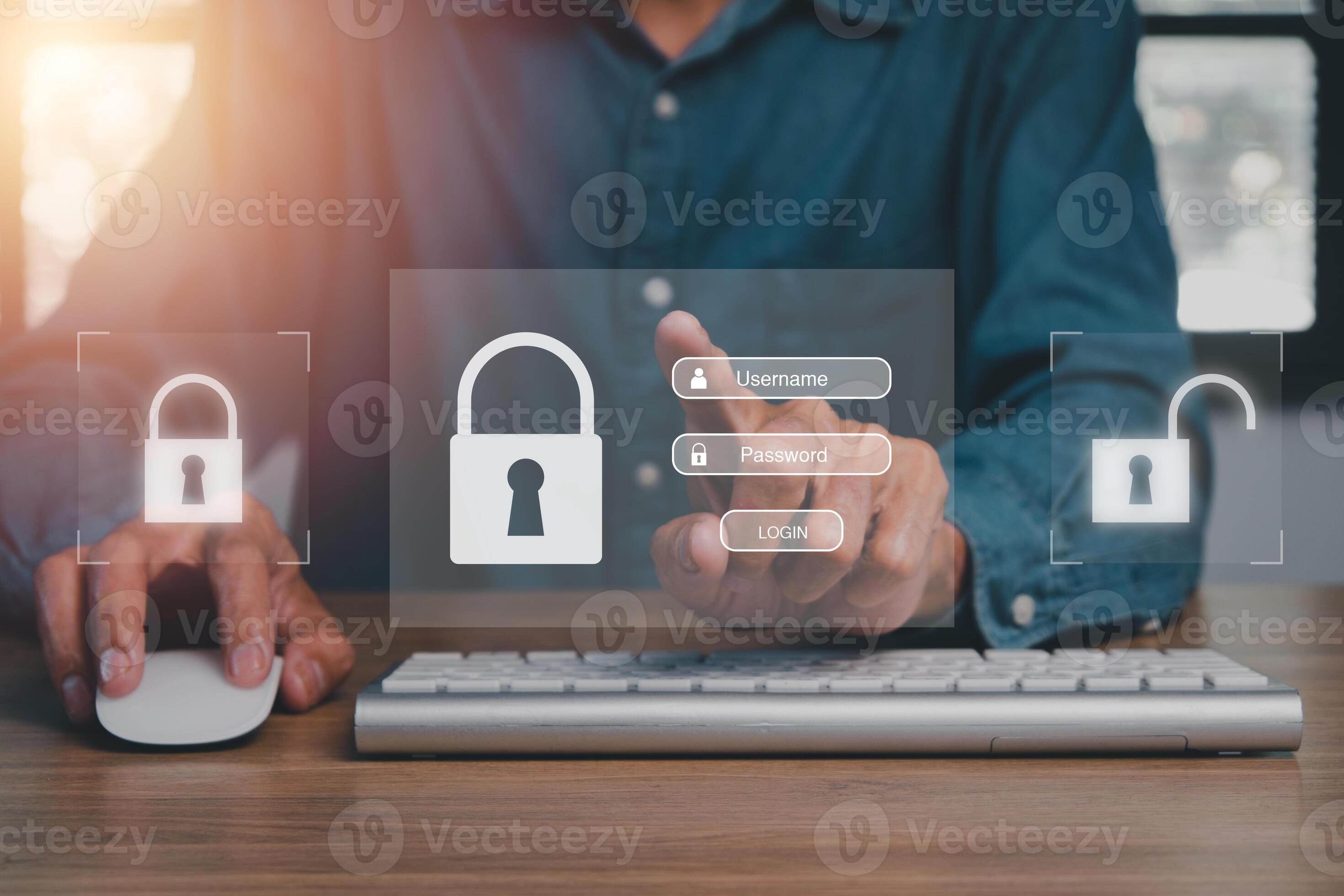 Man Hand Typing On Keyboard With Login And Password On Screen Display