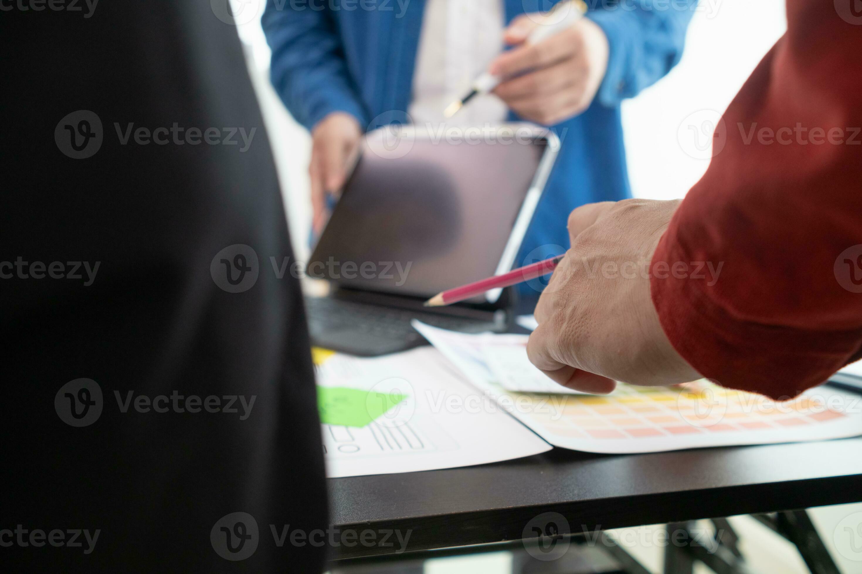 team of UI UX web designer are working together to develop mobile ...