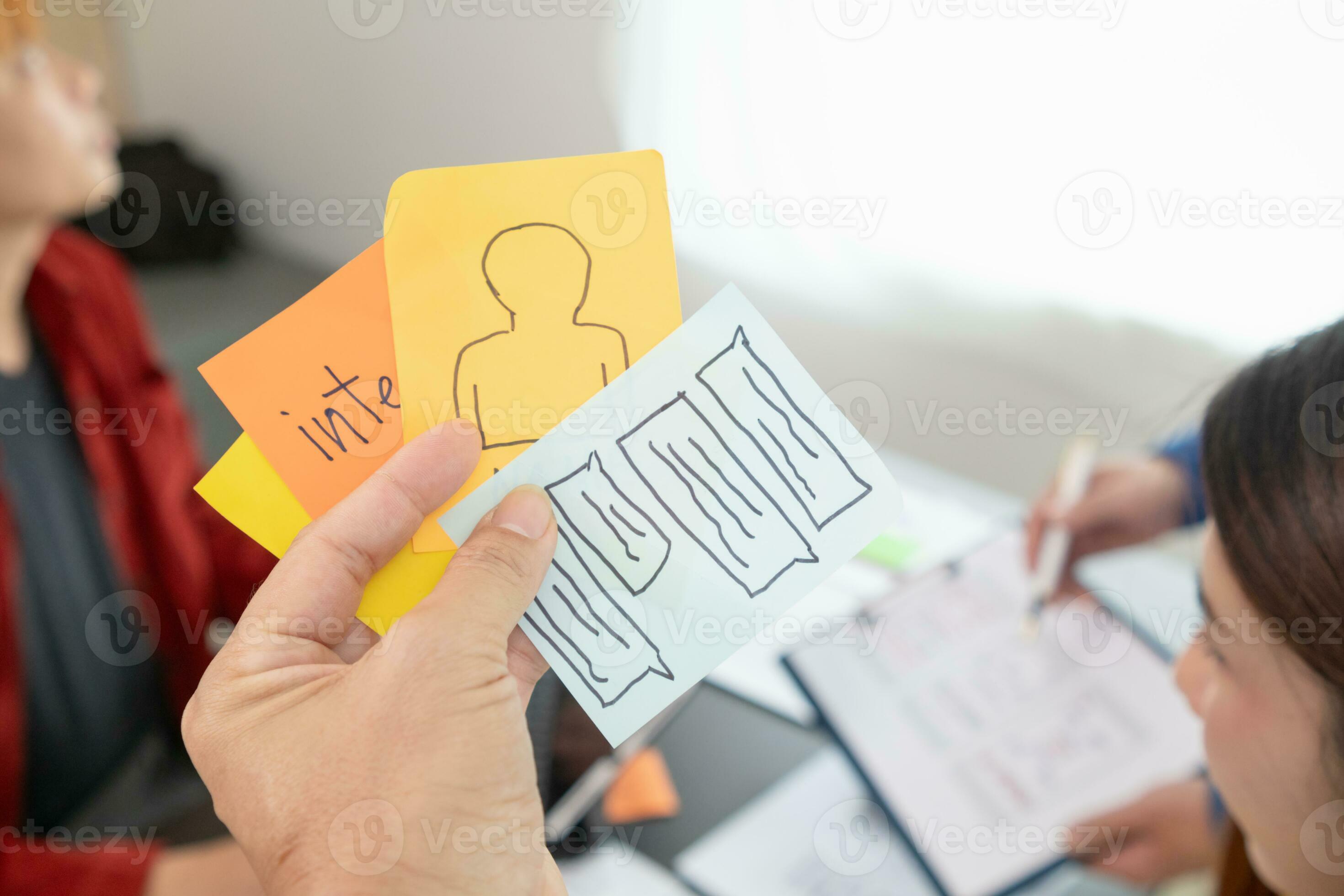 team of UI UX web designer are working together to develop mobile ...