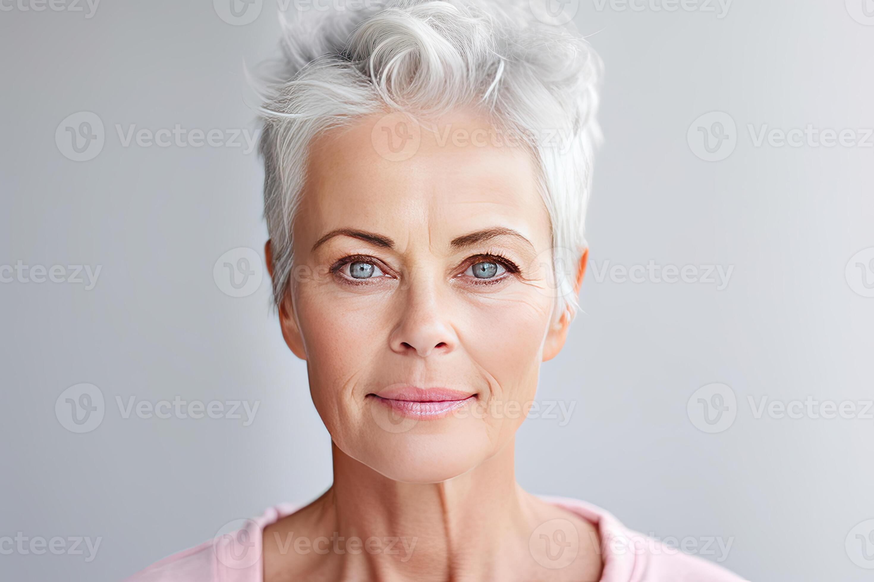 Beautiful Gorgeous 50s Mid Aged Mature Woman Looking At Camera Isolated