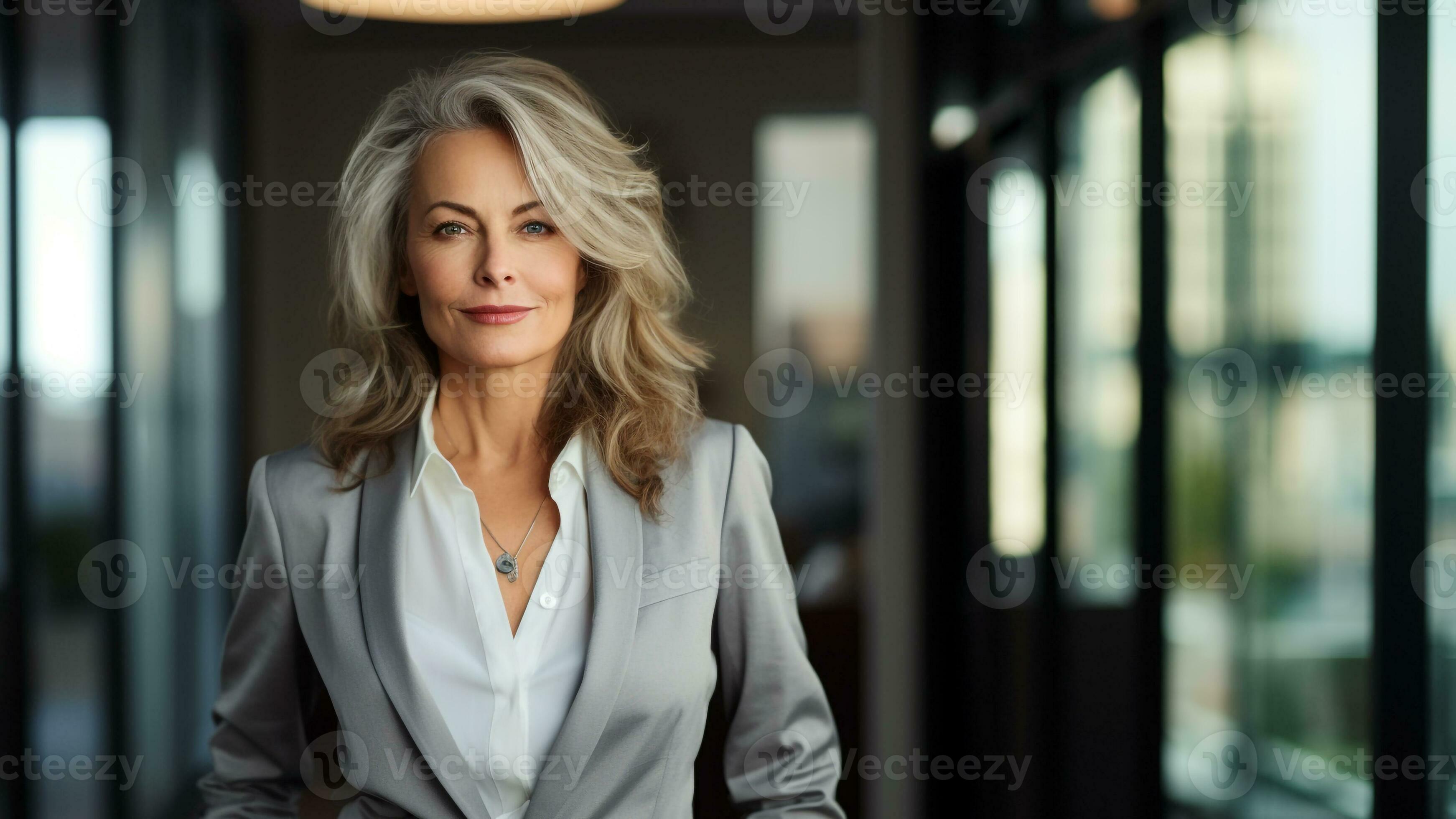 Confident and Elegant Mature Businesswoman Rocking an Expensive Suit ...