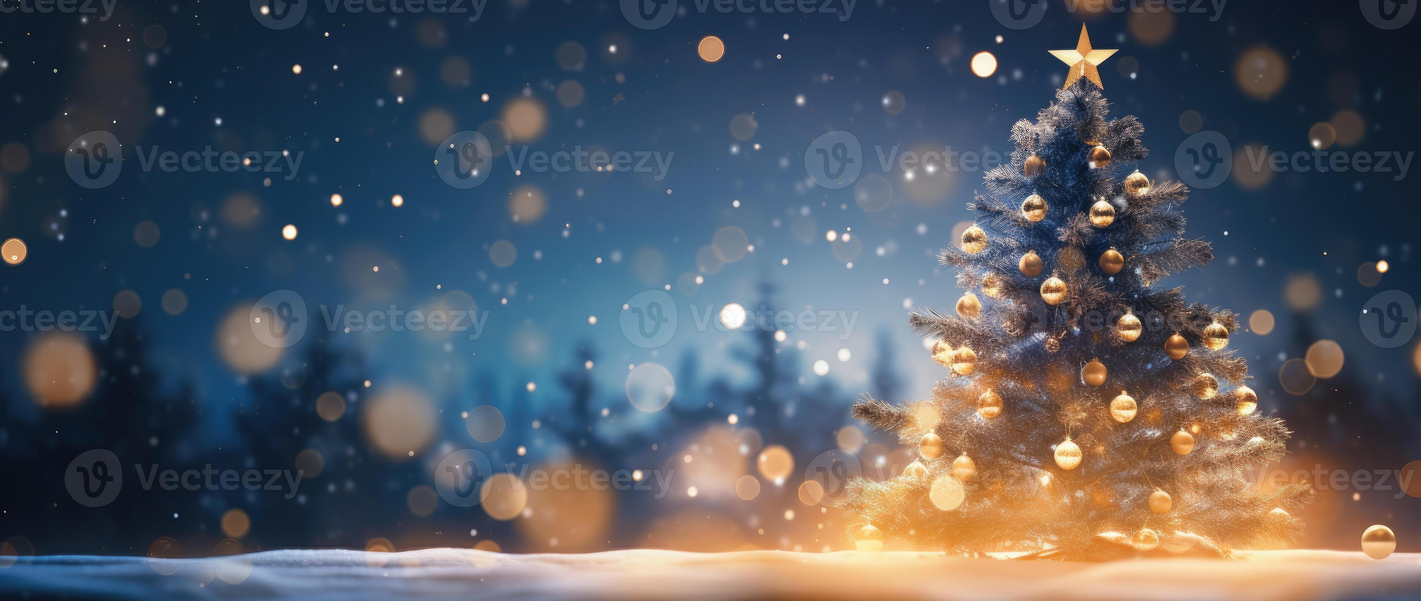 Christmas tree in the snow with golden stars and bokeh background ...