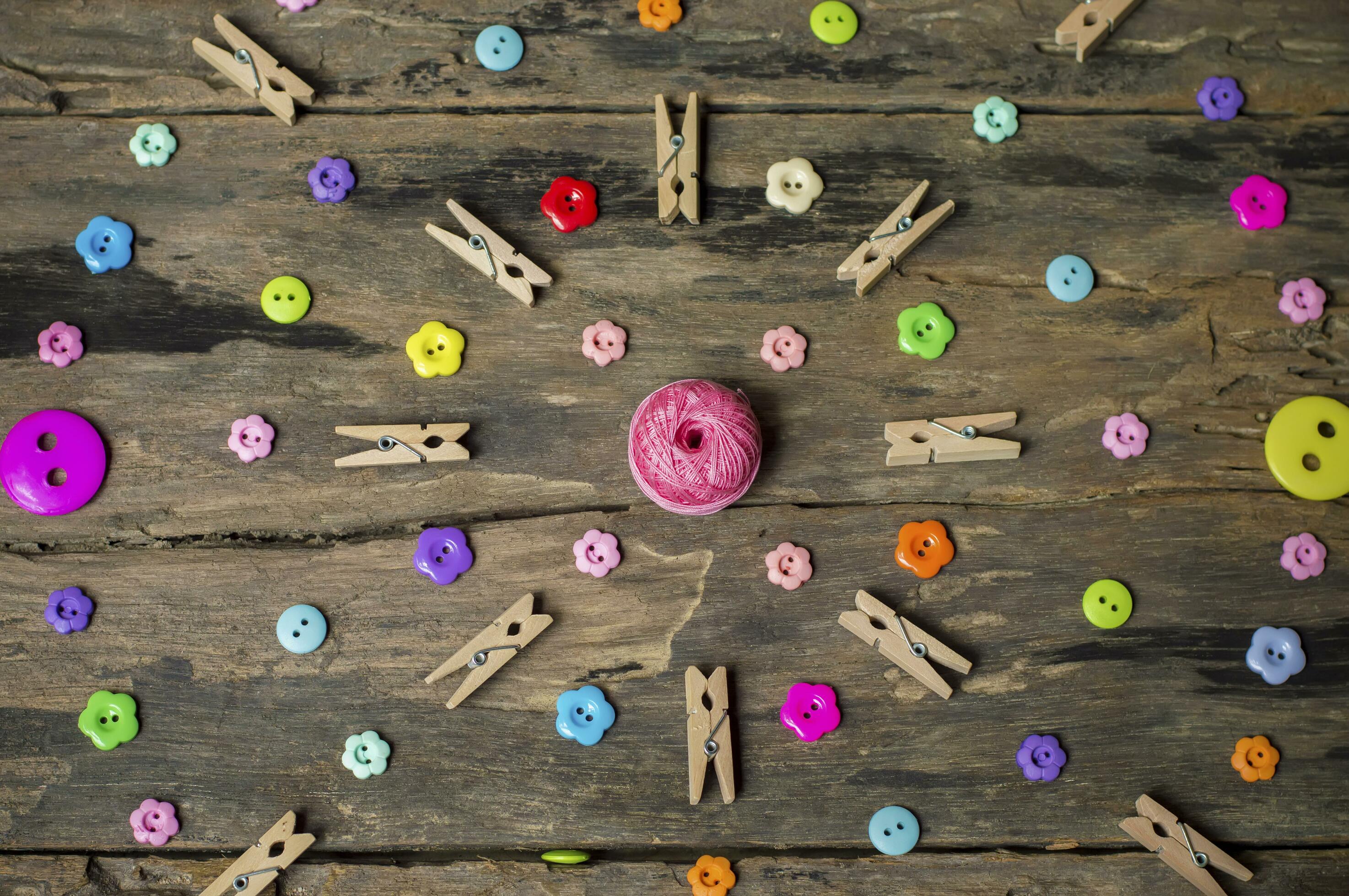 colorful buttons on wooden background 30534214 Stock Photo at Vecteezy