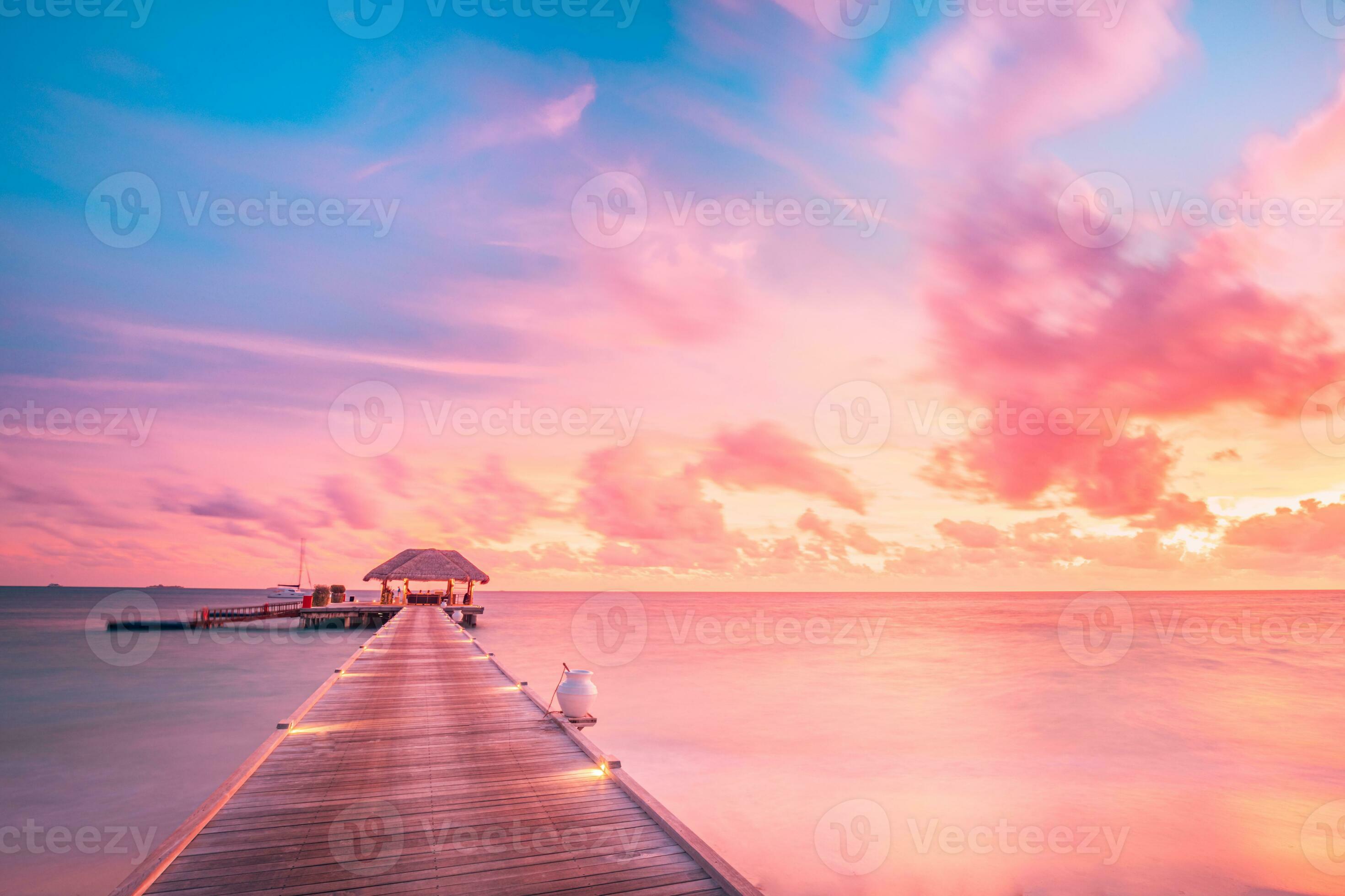 Beautiful sunset beach scene. Colorful sky and clouds view with calm ...