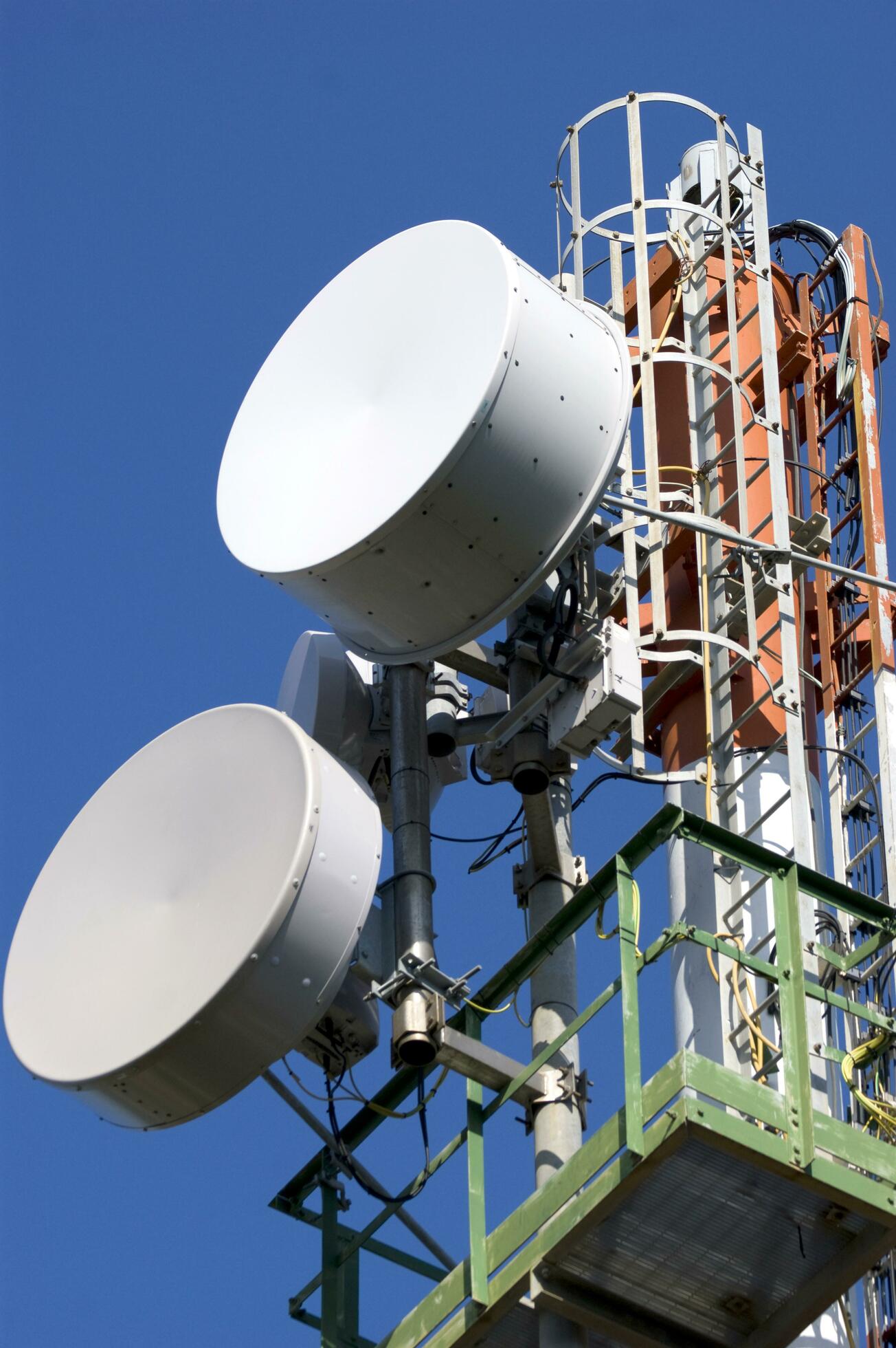 a cell phone tower with two antennas 30745945 Stock Photo at Vecteezy