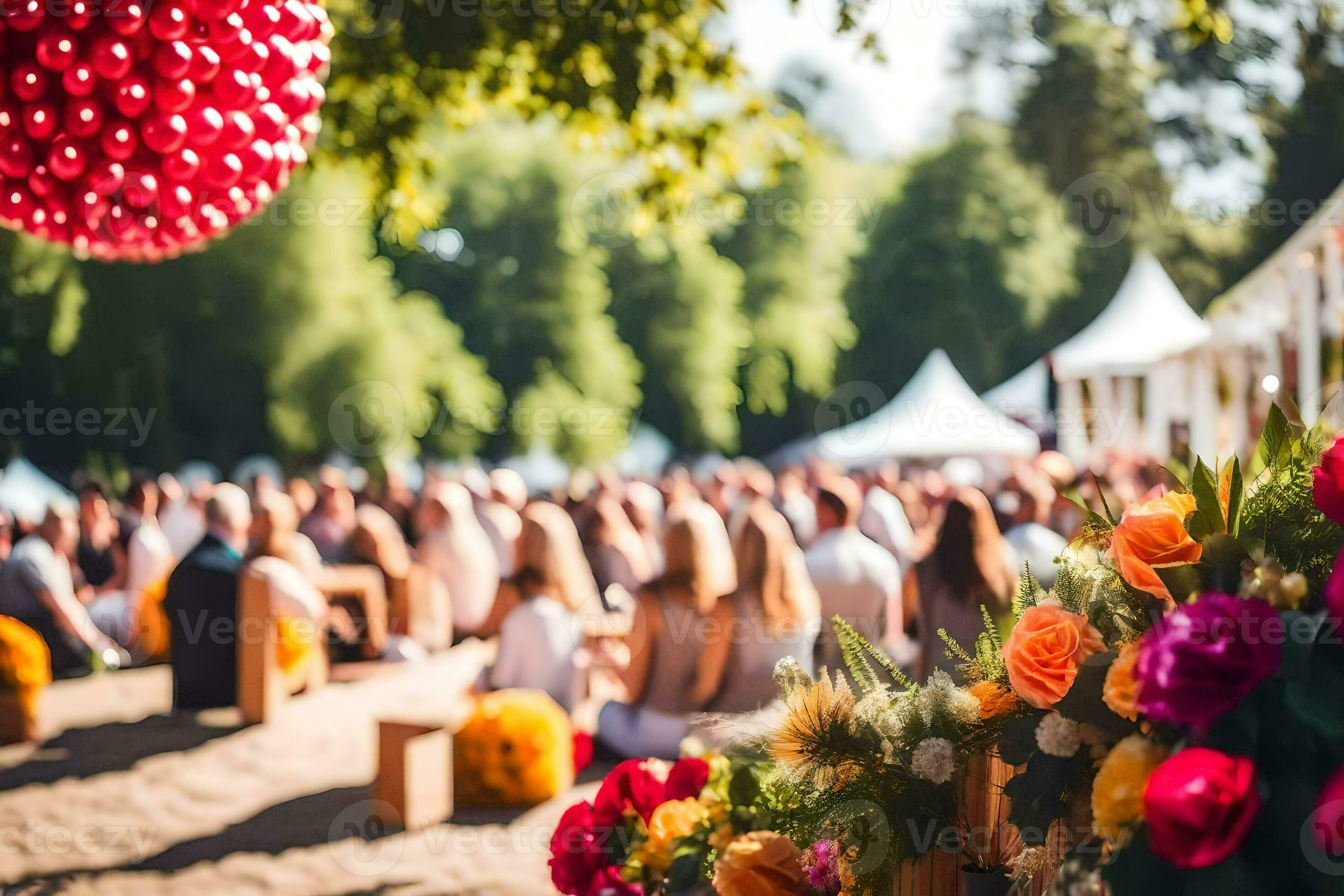 A Large Crowd Of People Sitting In The Grass At A Festival Ai