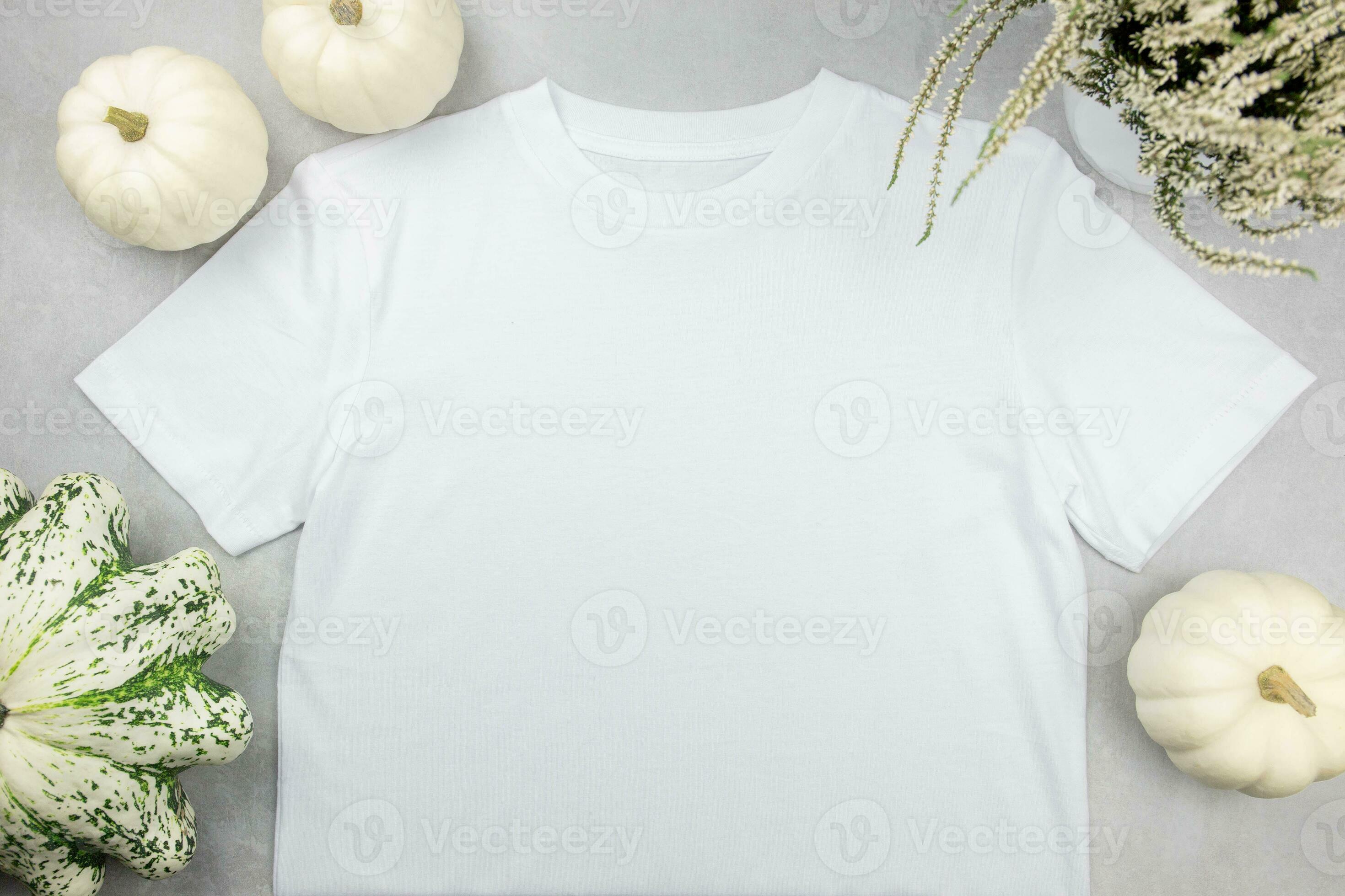 White Womens Cotton T Shirt Mockup With Pumpkins On Gray Concrete