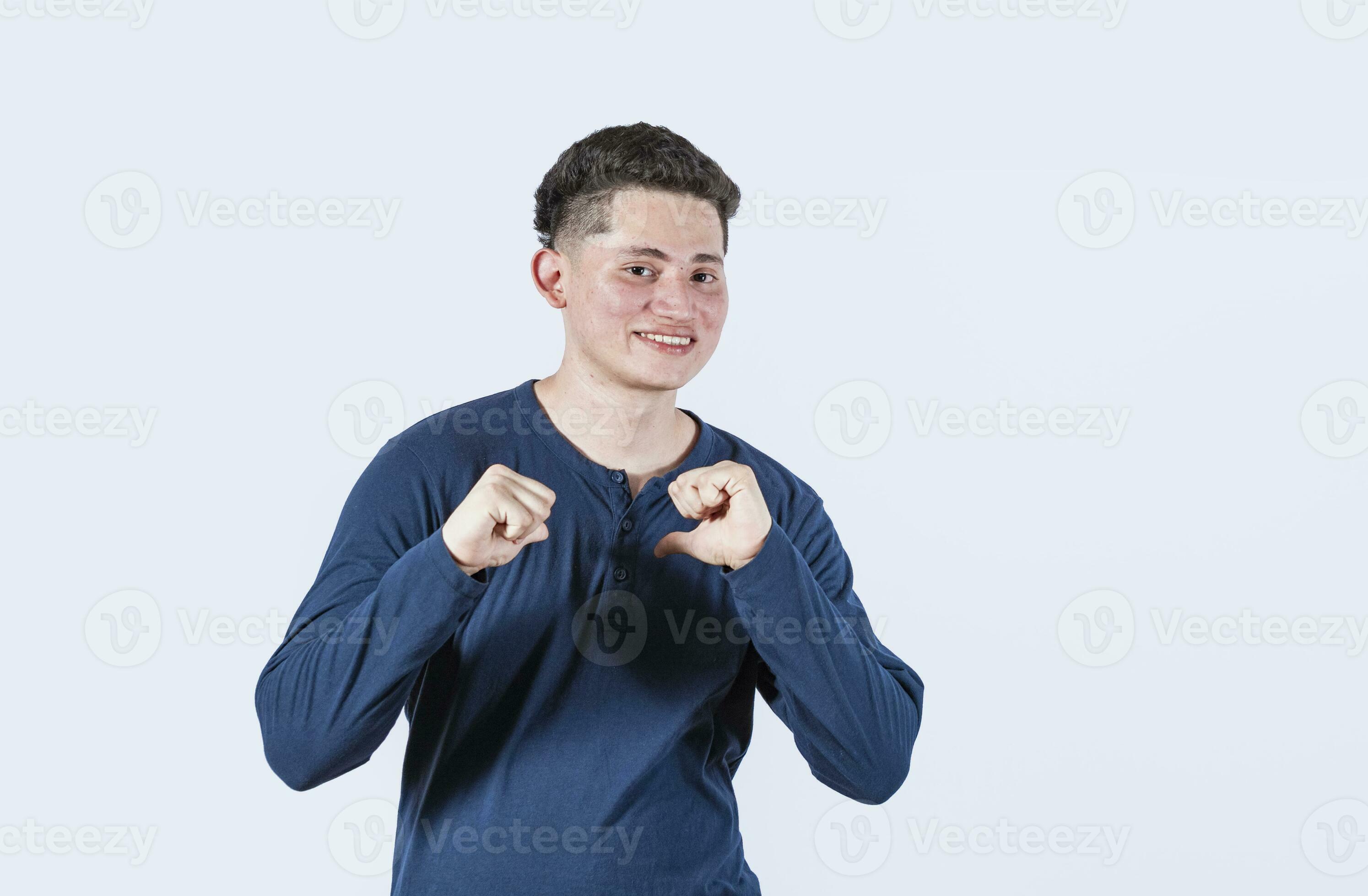 Smiling man pointing at himself, a person who smiles pointing at ...