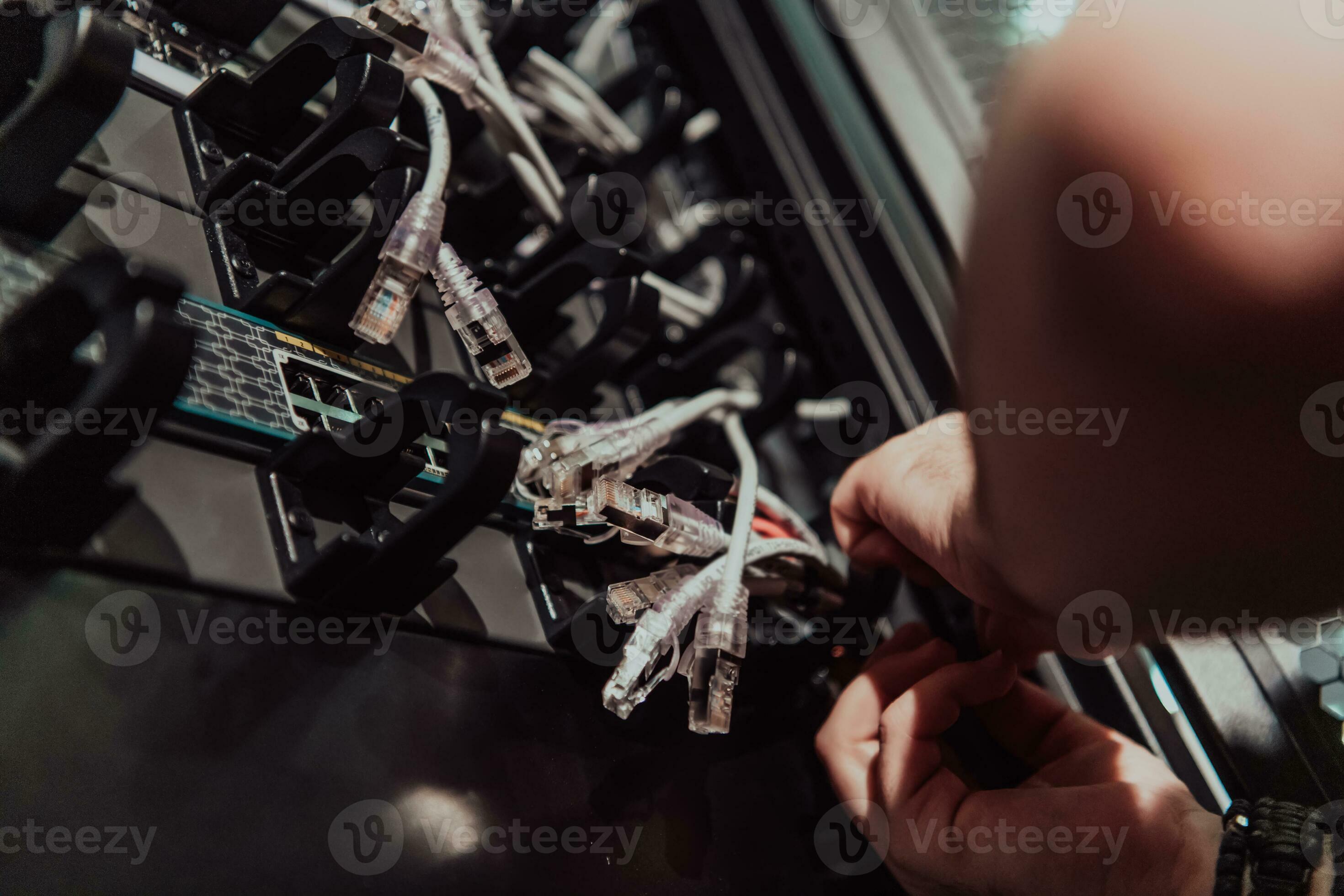 Close up of technician setting up network in server room 31029544 Stock ... Close up of technician setting up network in server room 31029544 Stock ...