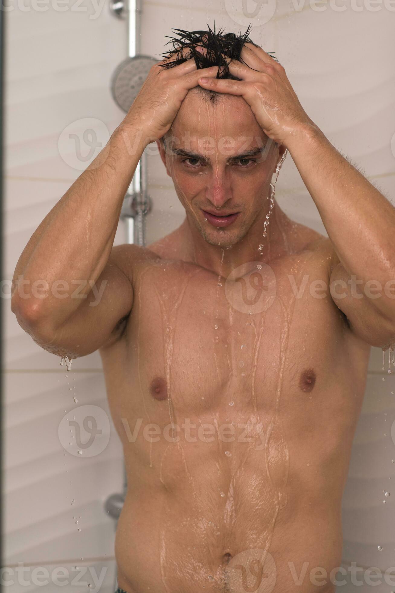 man taking shower in bath 31041498 Stock Photo at Vecteezy