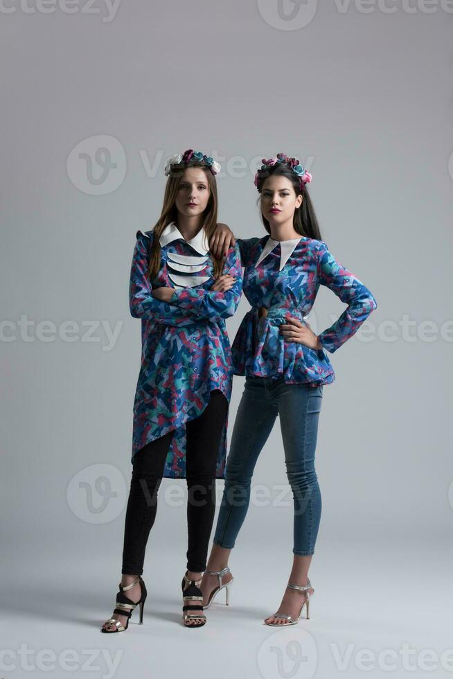 two Fashion Model girls isolated over white background 31058479 Stock ...