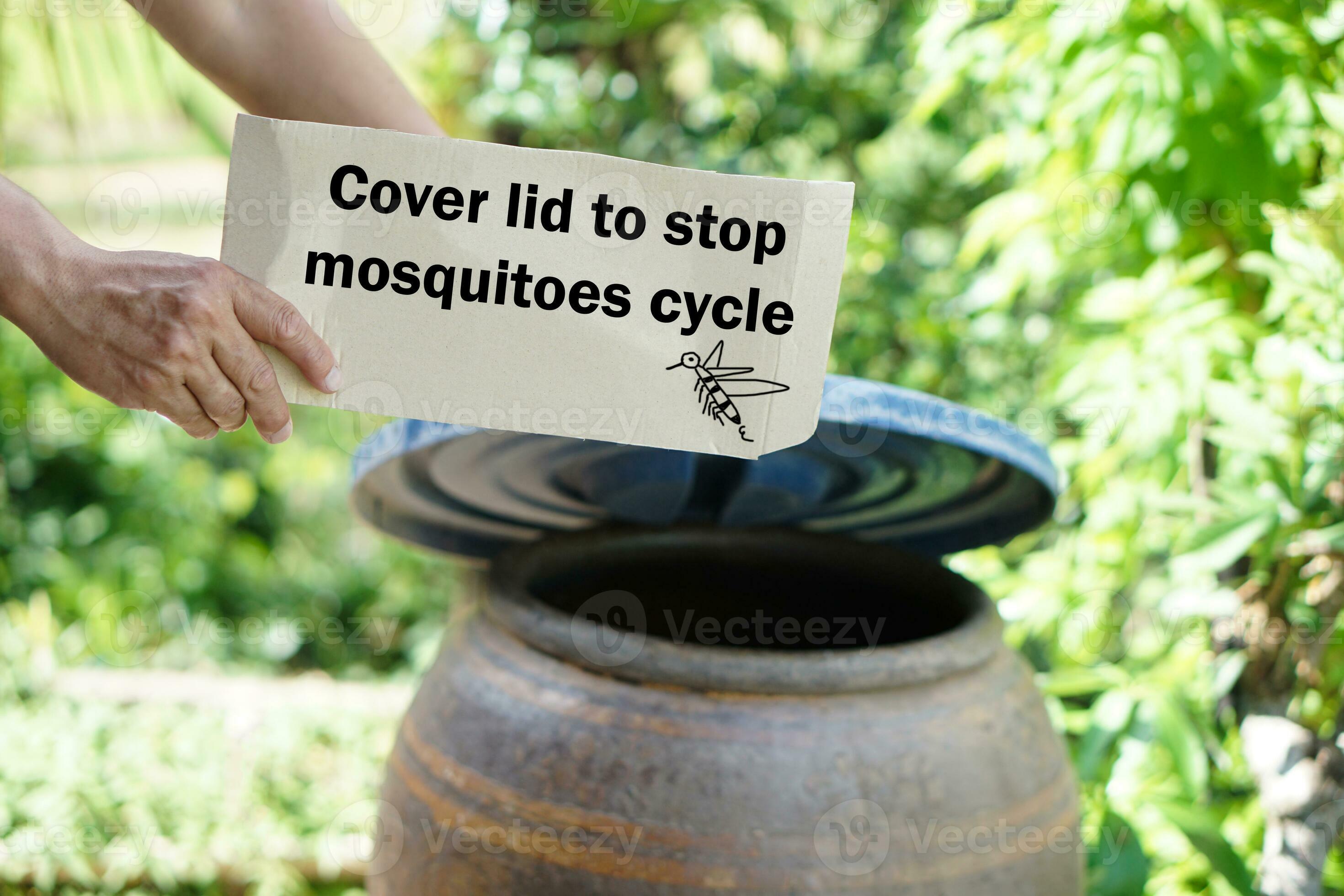 Hand Hold Paper Card With Word Cover Lid To Stop Mosquitoes Cycle Covering Lid Of Water Jar