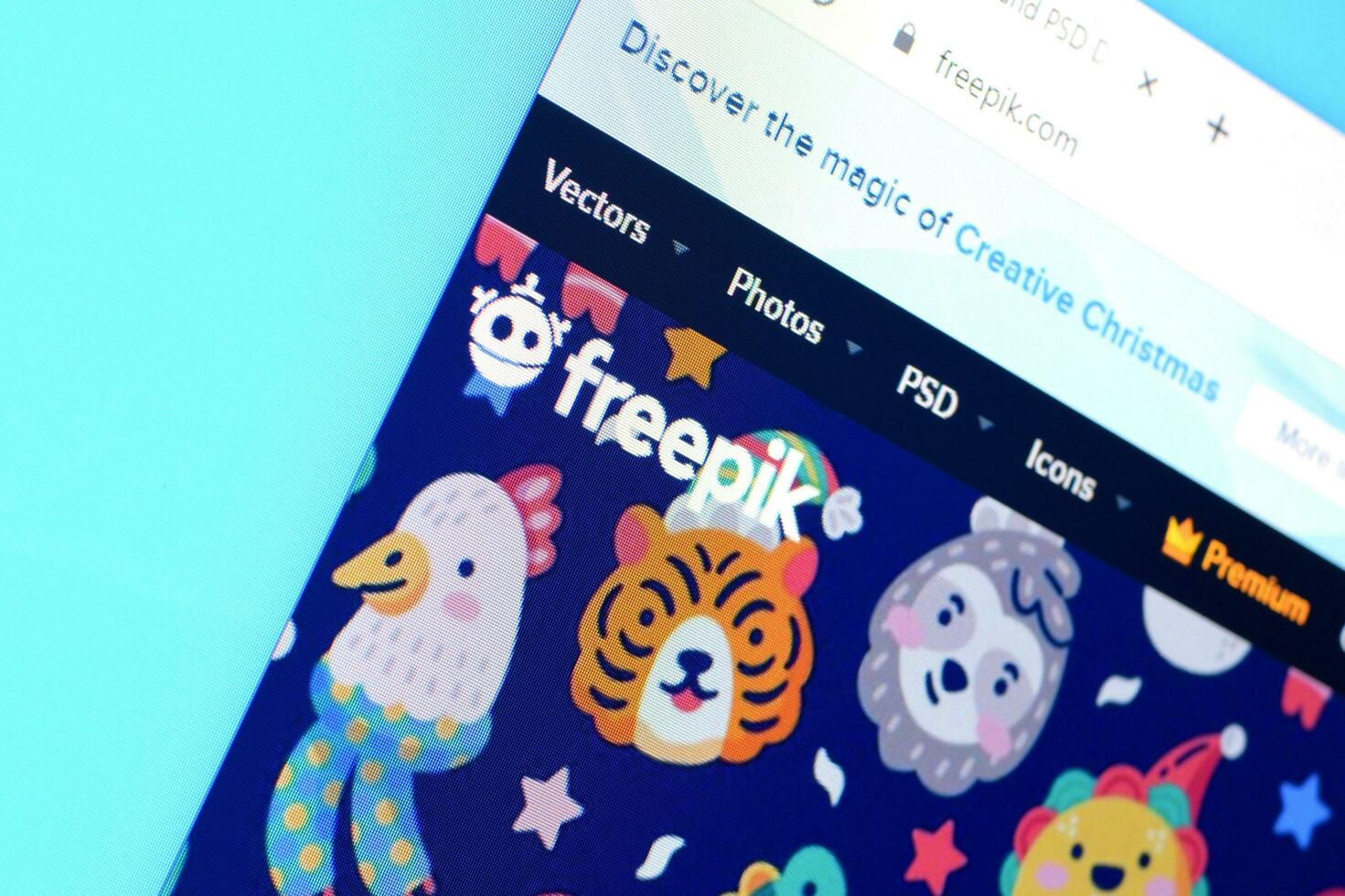 Homepage of freepik website on the display of PC, url - freepik.com ...