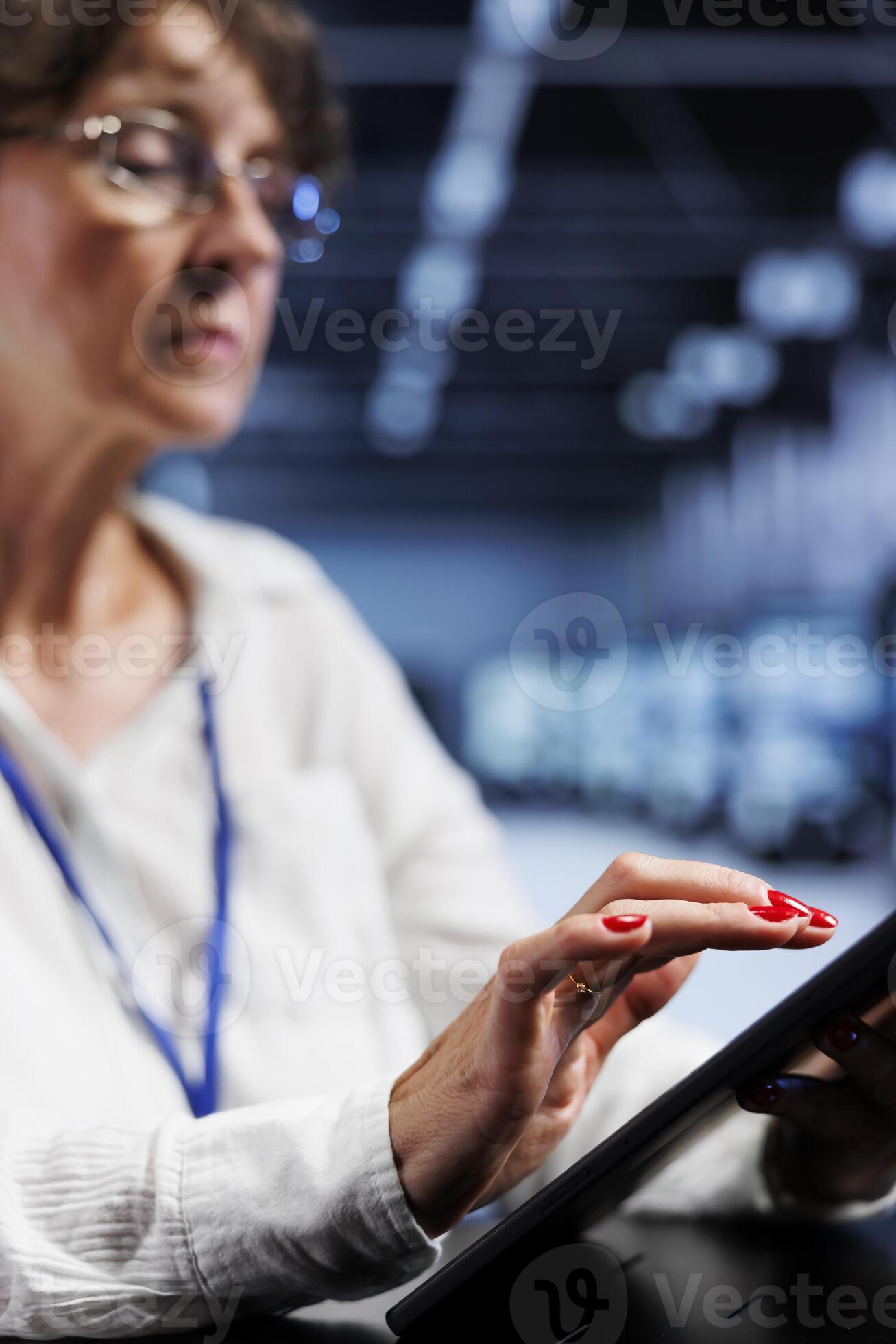 Licensed Computer Operator Using Tablet To Assess Server Security