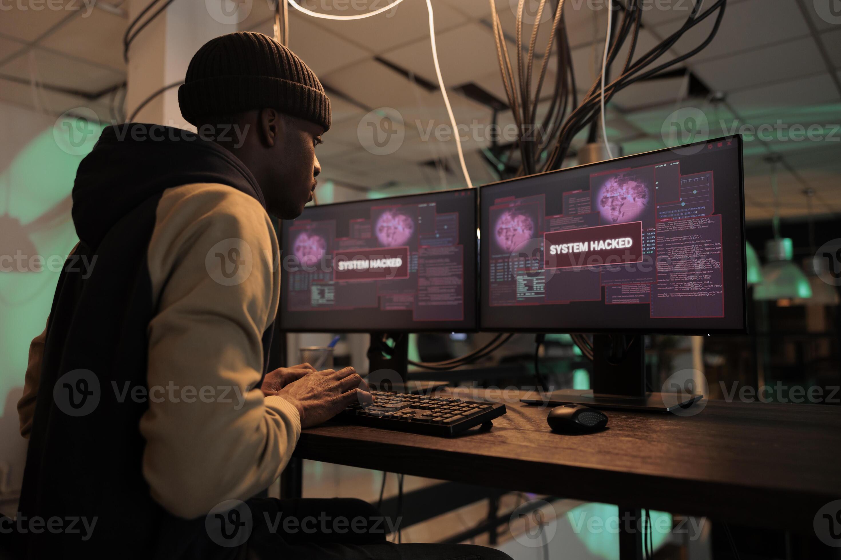 Criminal cyberattack, hacker accessing computer system, man writing password cracking software ...