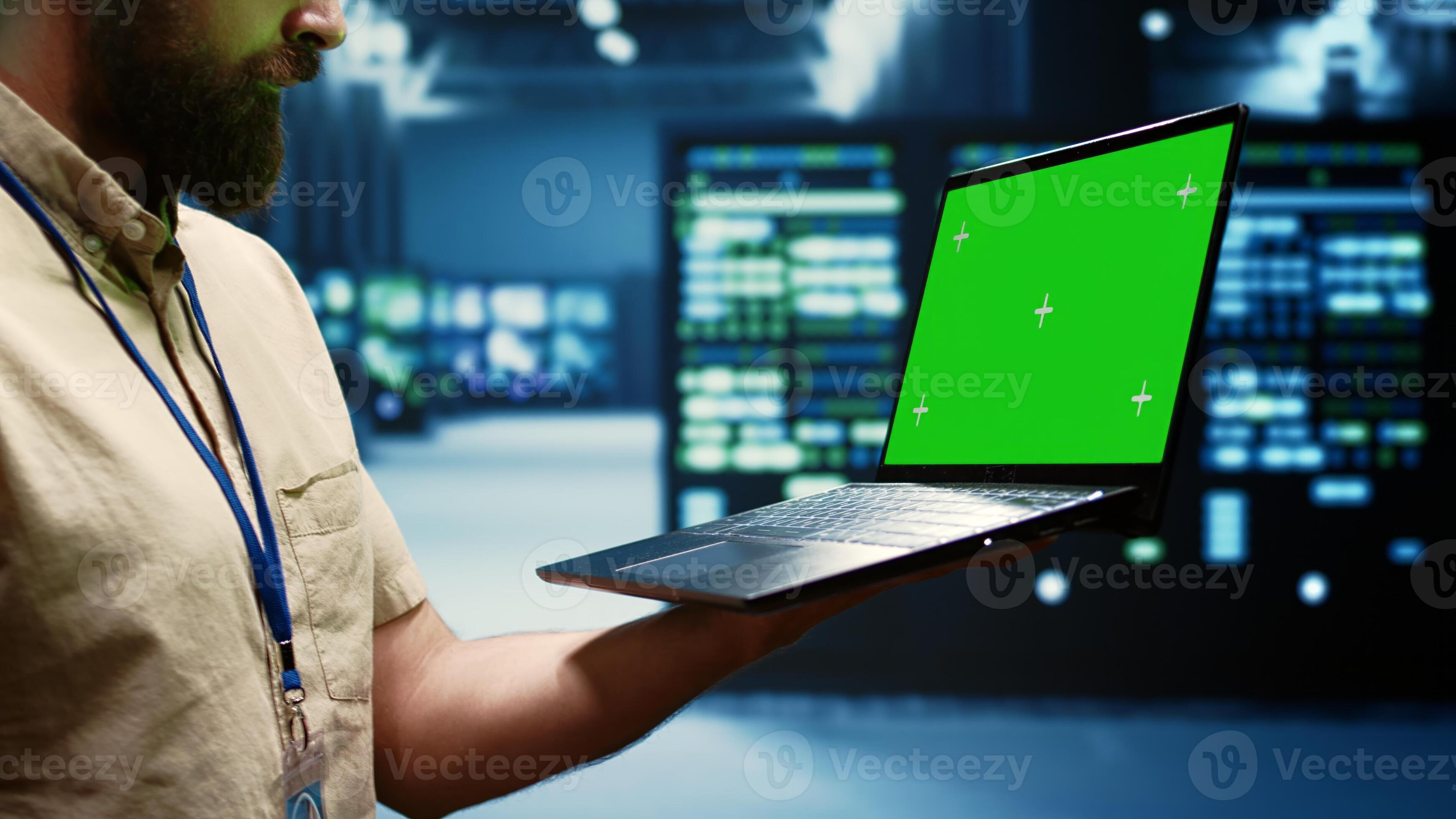 Specialist Using Green Screen Laptop To Check Server Clusters Configuration Settings Close Up