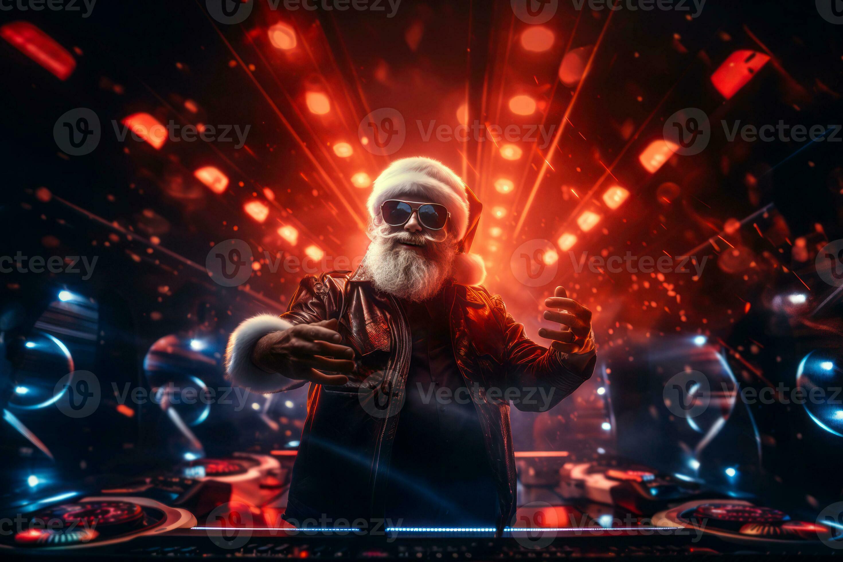 A stylish Santa Claus dancing with the crowd in a discotheque with ...