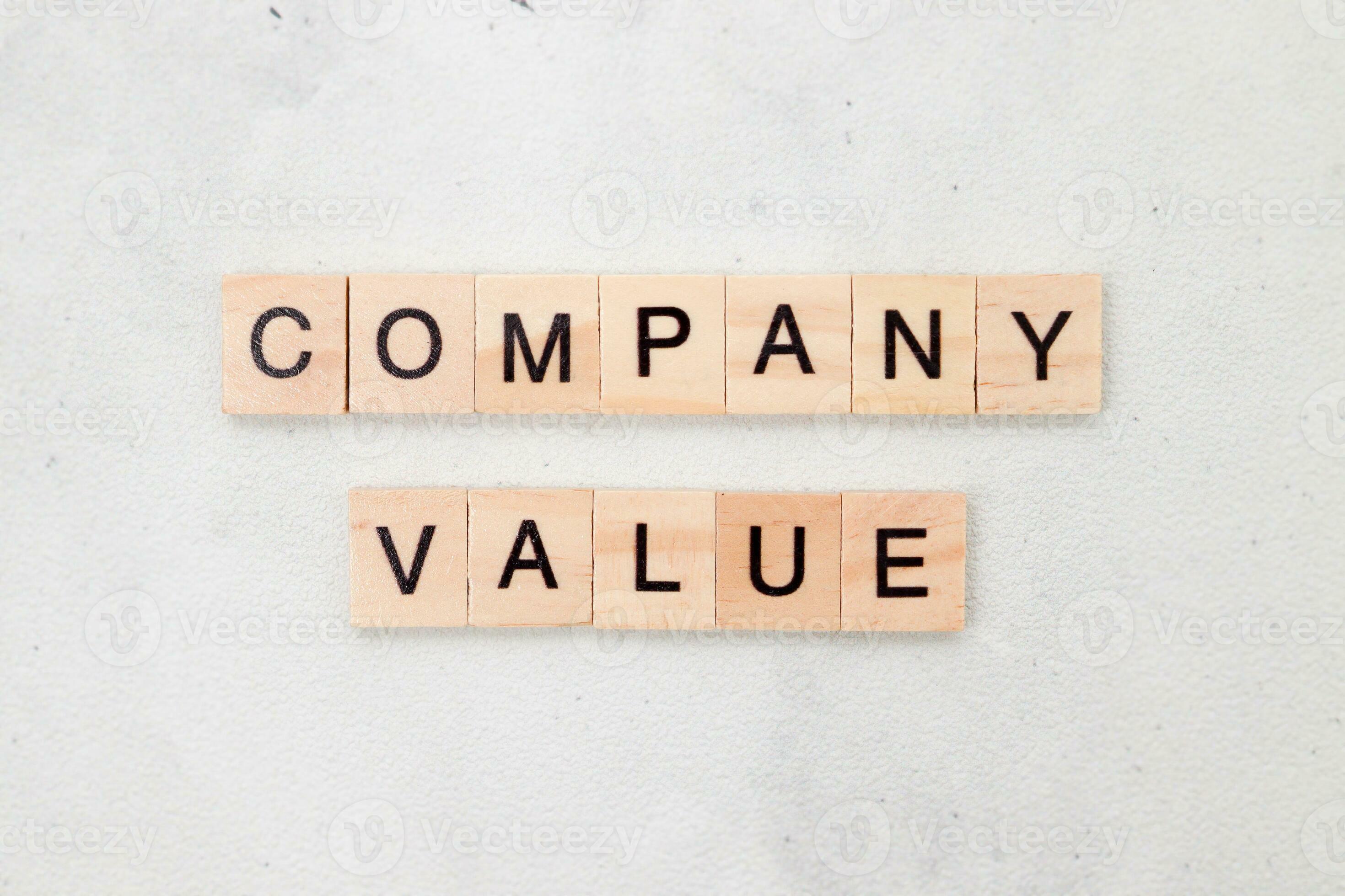 Top view of Company Value word on wooden cube letter block on white ...