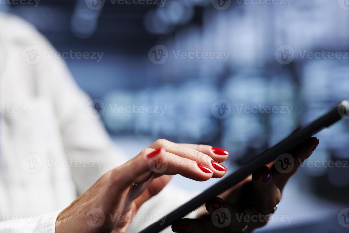 Cloud Computing Business Executive Using Tablet To Assess Data Center
