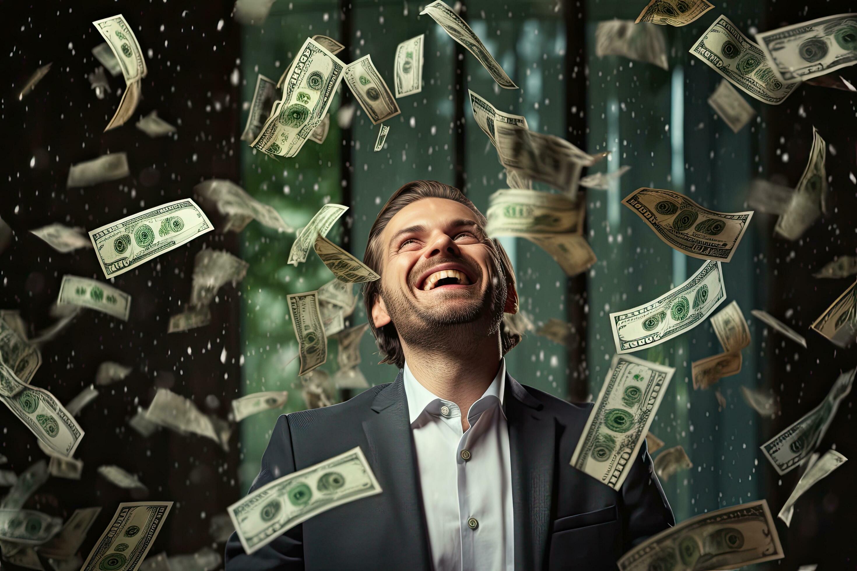 Businessman under rain with dollar bills flying in the air. Success concept, Happy successful ...