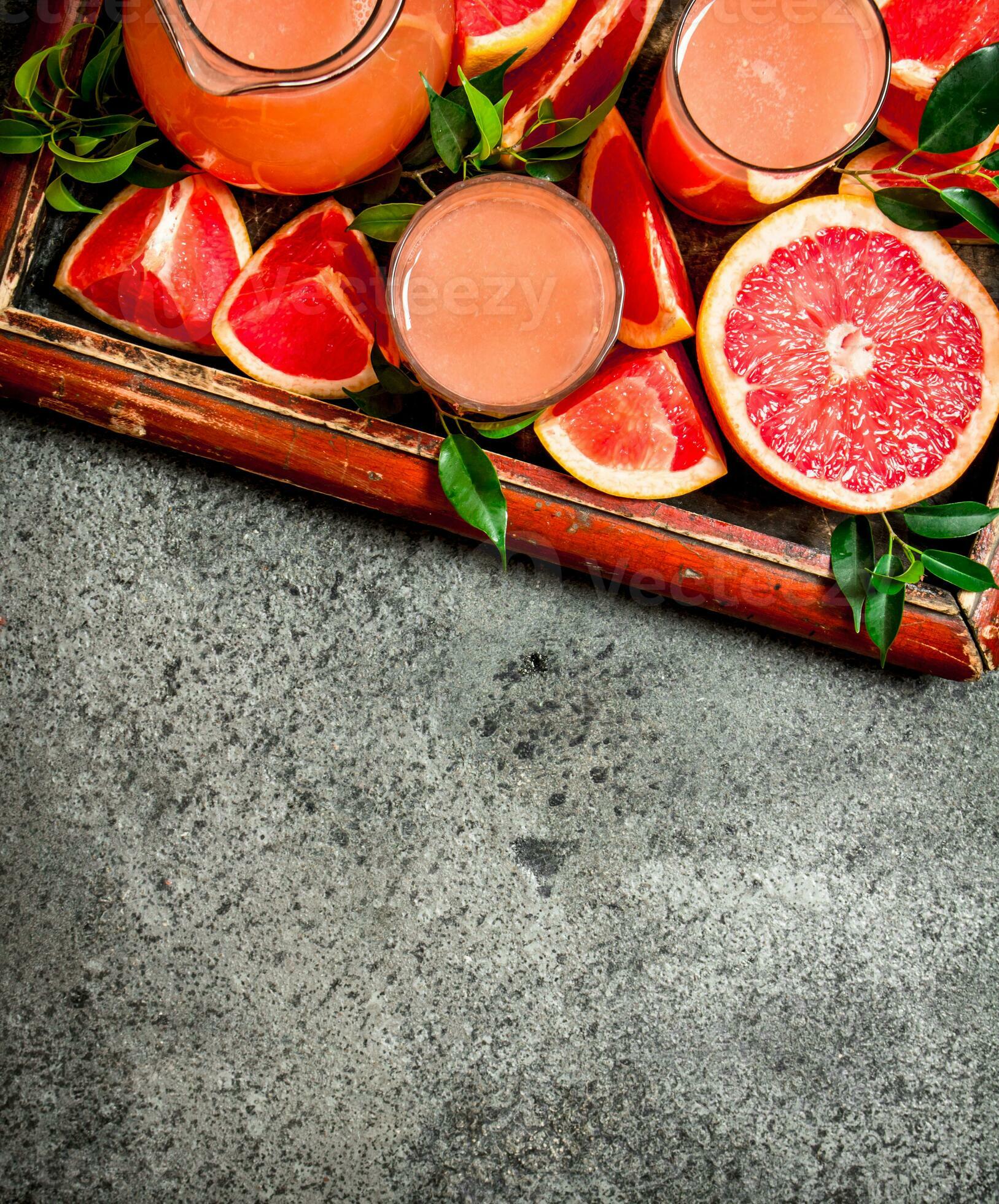 Freshly squeezed grapefruit juice. 32023409 Stock Photo at Vecteezy Freshly squeezed grapefruit juice. 32023409 Stock Photo at Vecteezy