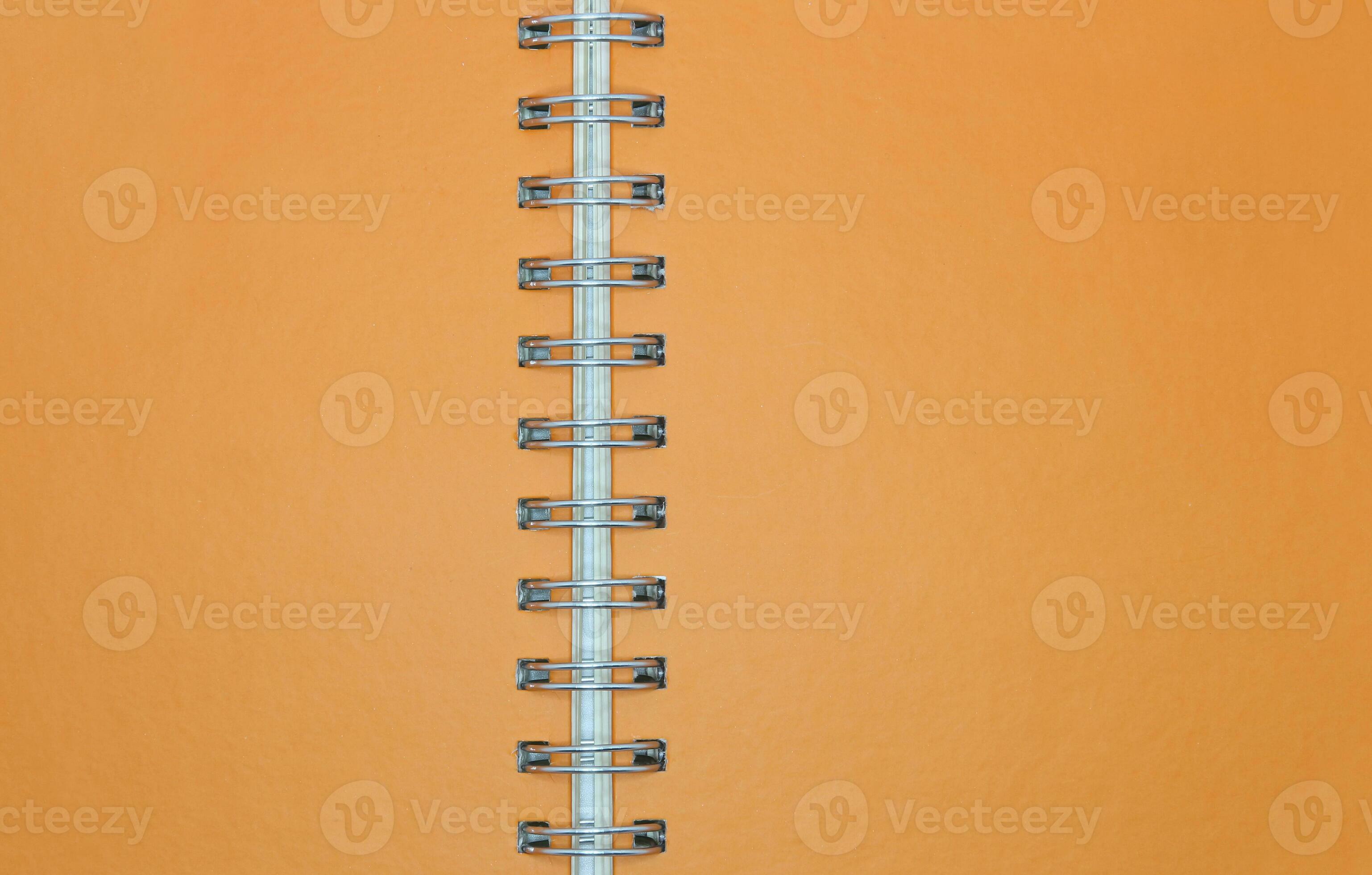 Blank orange notebook paper with ring spine for background 32047482 ...