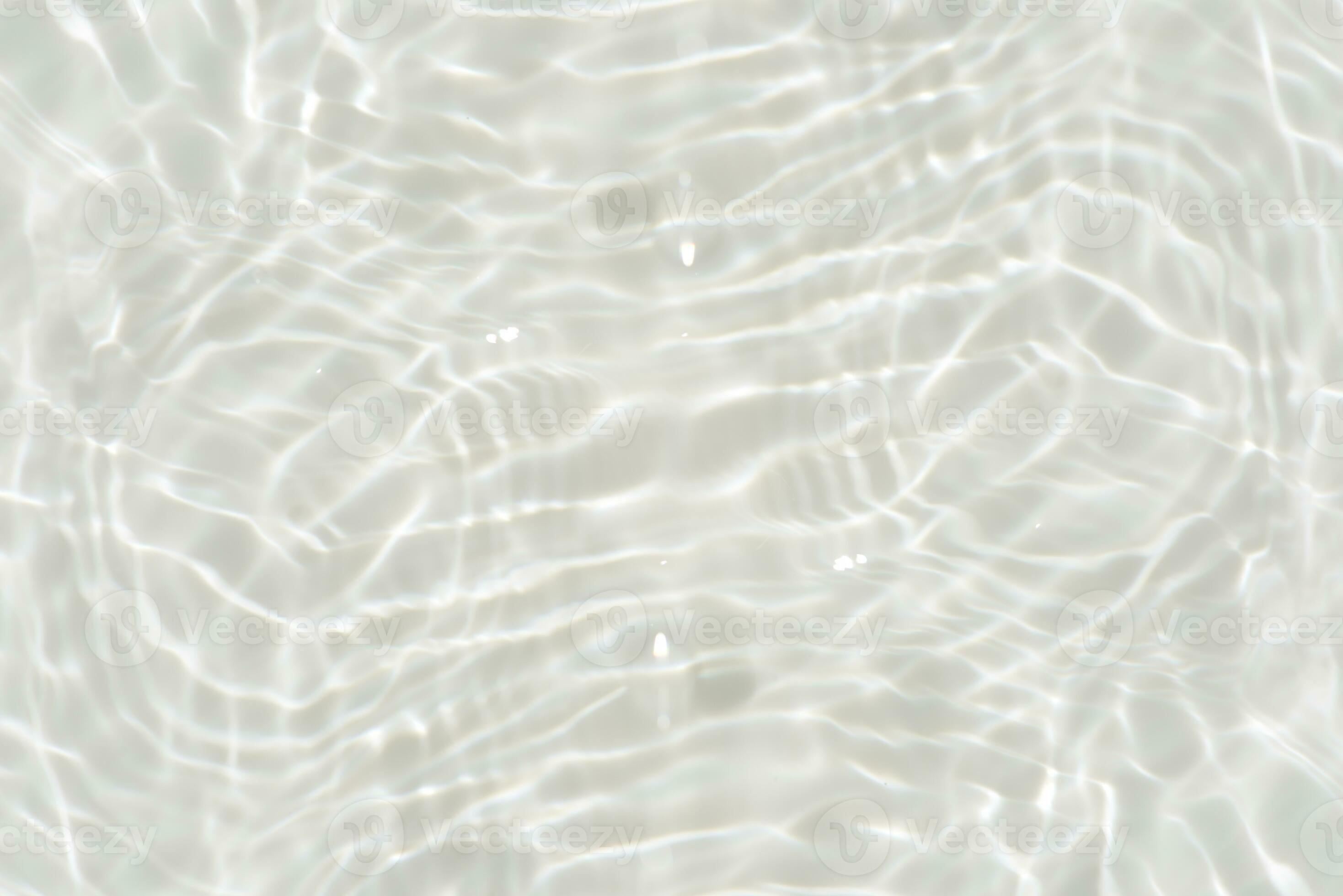 Blue water with ripples on the surface. Defocus blurred transparent blue colored clear calm ...