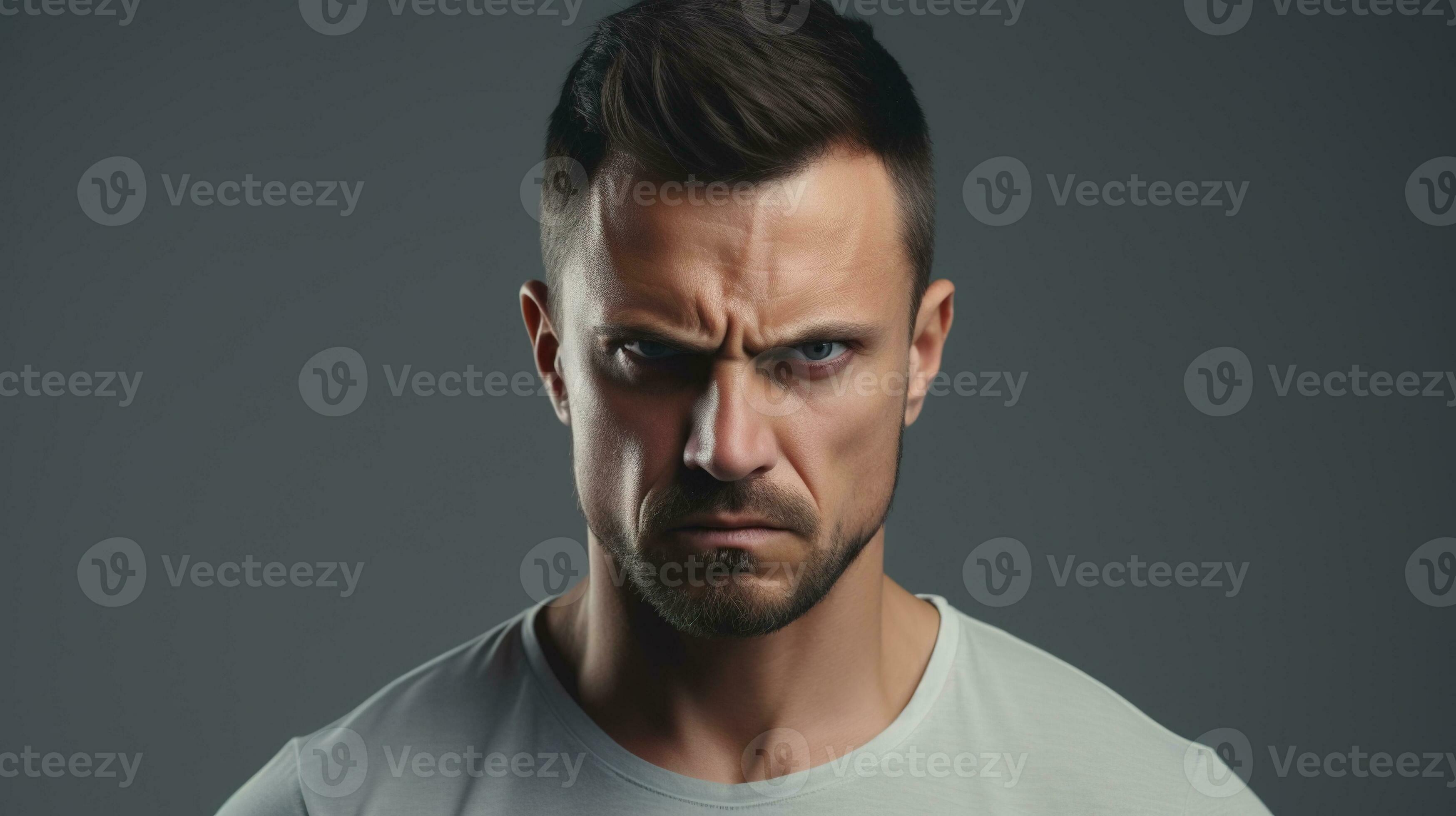 Angry Man Looking at the Camera Isolated on the Minimalist Background ...