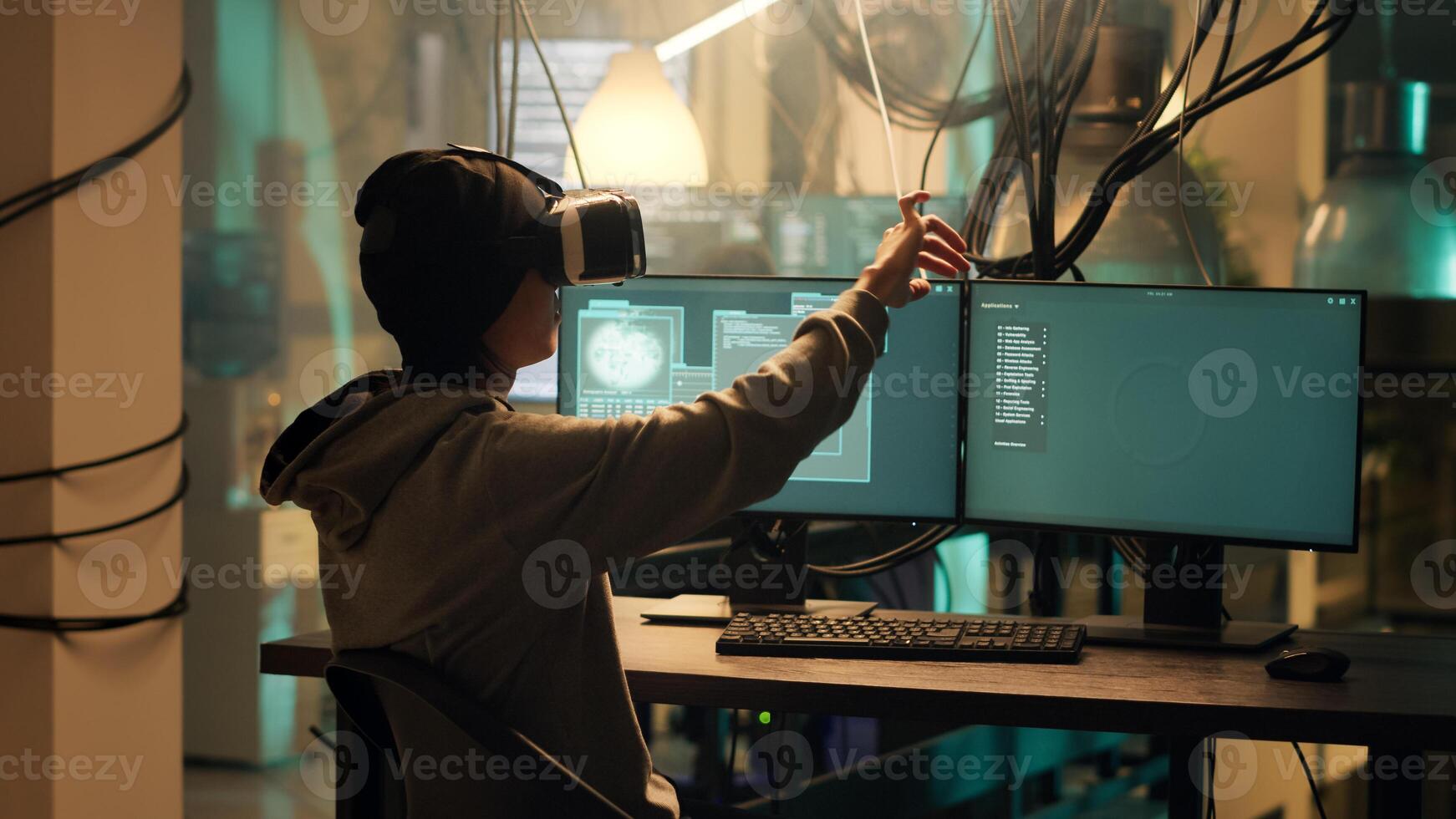Asian Hacker Creating Malware With Vr Glasses At Night Using Virtual
